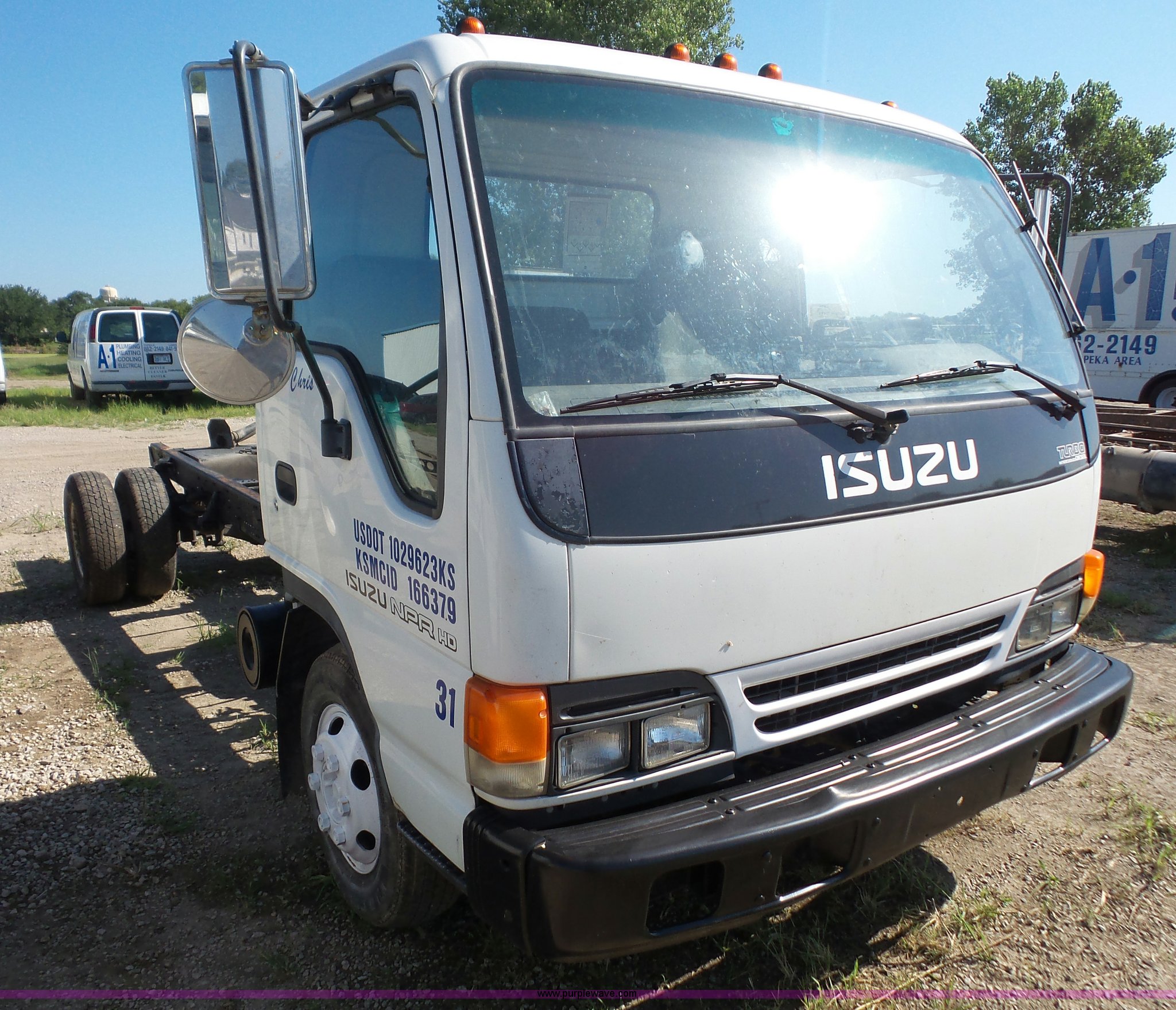 2003 Isuzu NPR HD truck cab and chassis in Wakarusa, KS | Item L4966 sold | Purple Wave