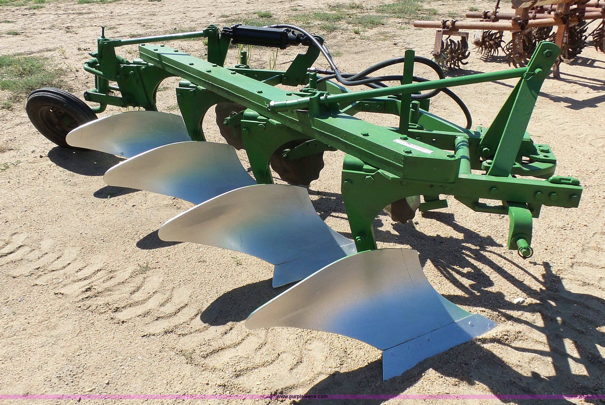John Deere four bottom plow in Kinsley, KS | Item CD9465 sold | Purple Wave