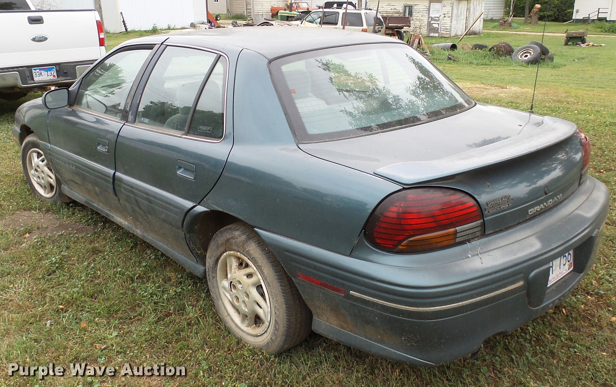 1998 Pontiac Grand AM in Highmore, SD | Item AL9103 sold | Purple Wave