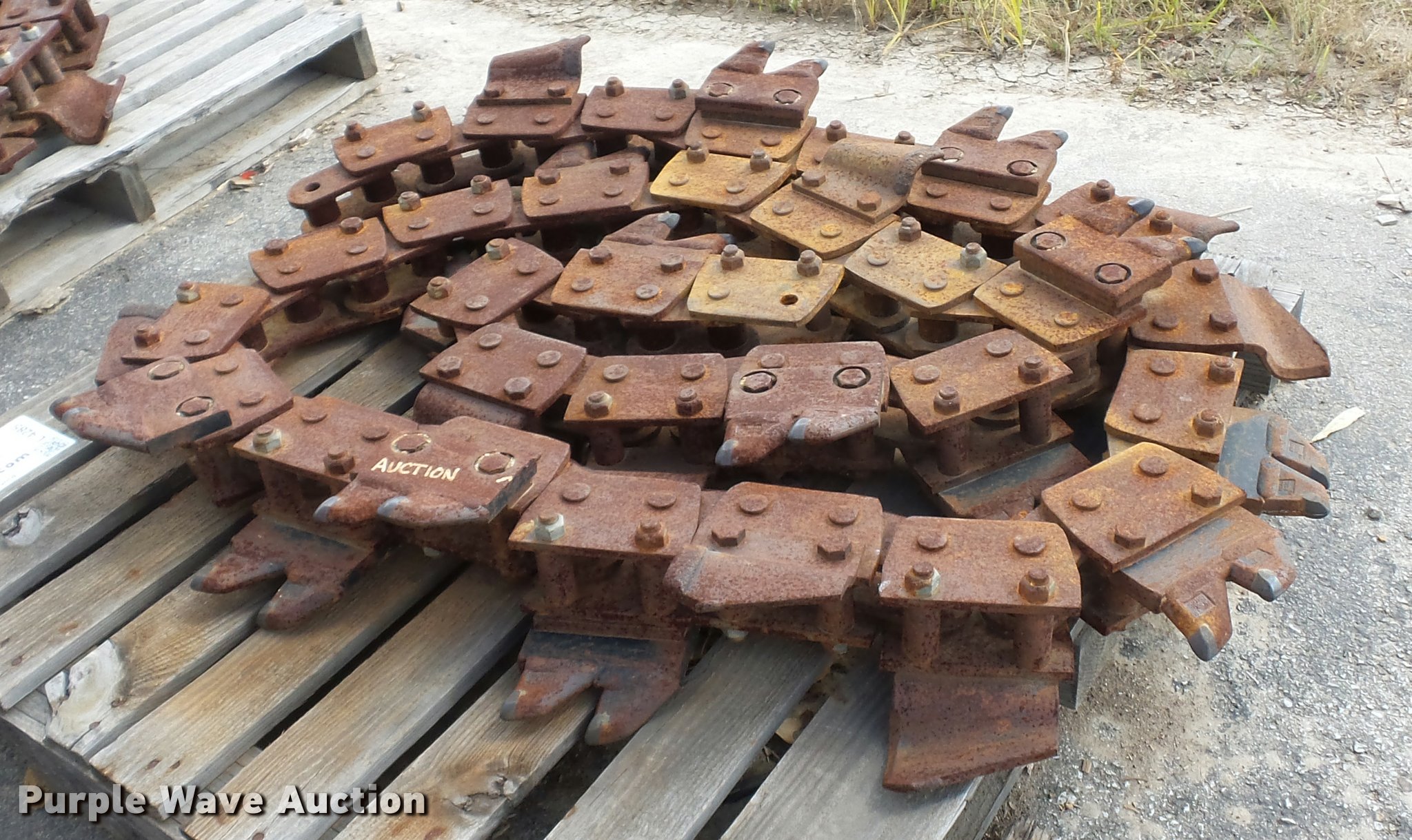 Trencher rock chain in Chesterfield, MO | Item L4285 sold | Purple Wave