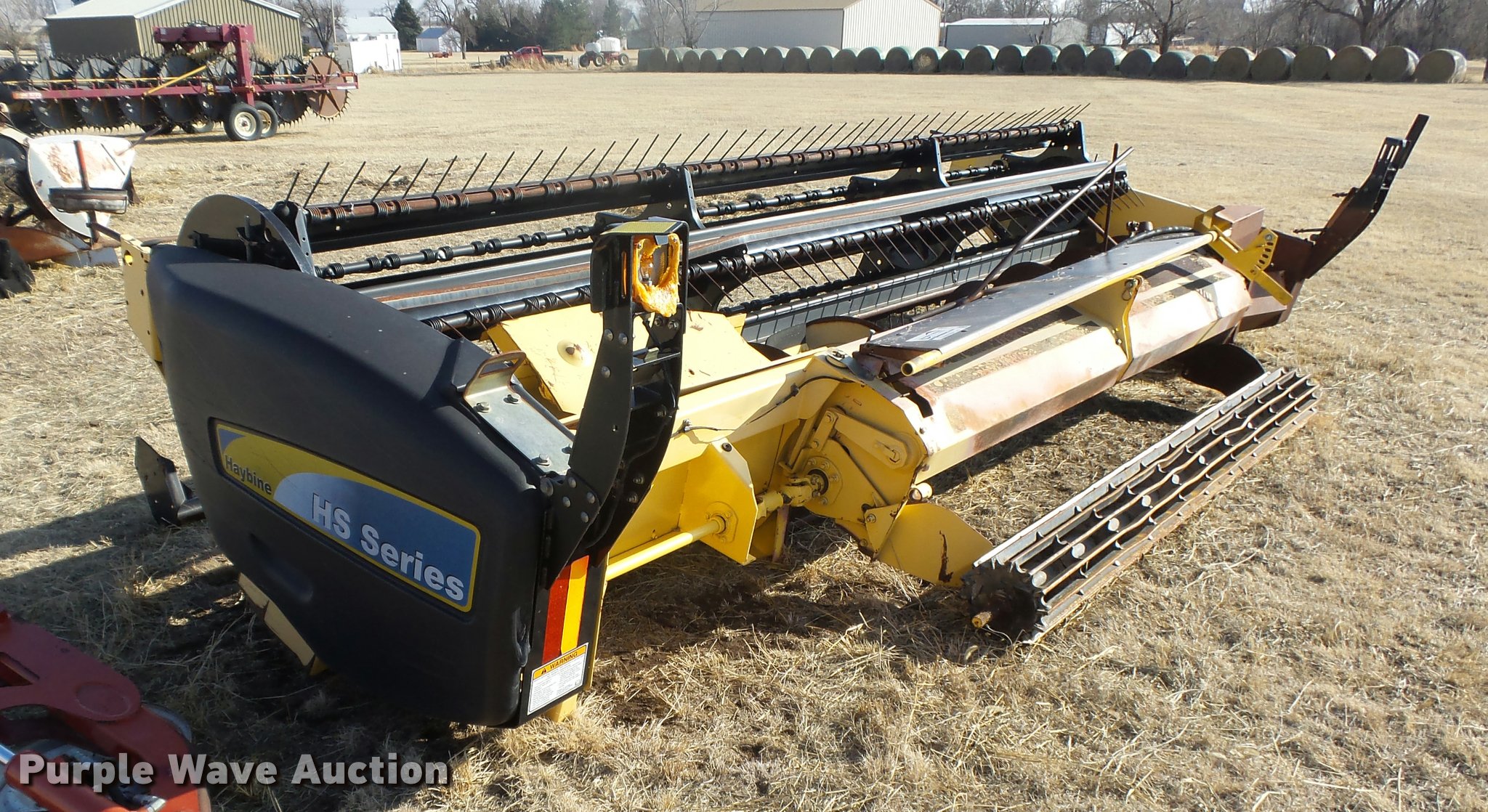 New Holland 16HS swather head in Bazine, KS | Item DB1842 sold | Purple ...