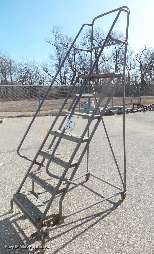 (2) steel ladders in Salina, KS | Item DA7708 sold | Purple Wave