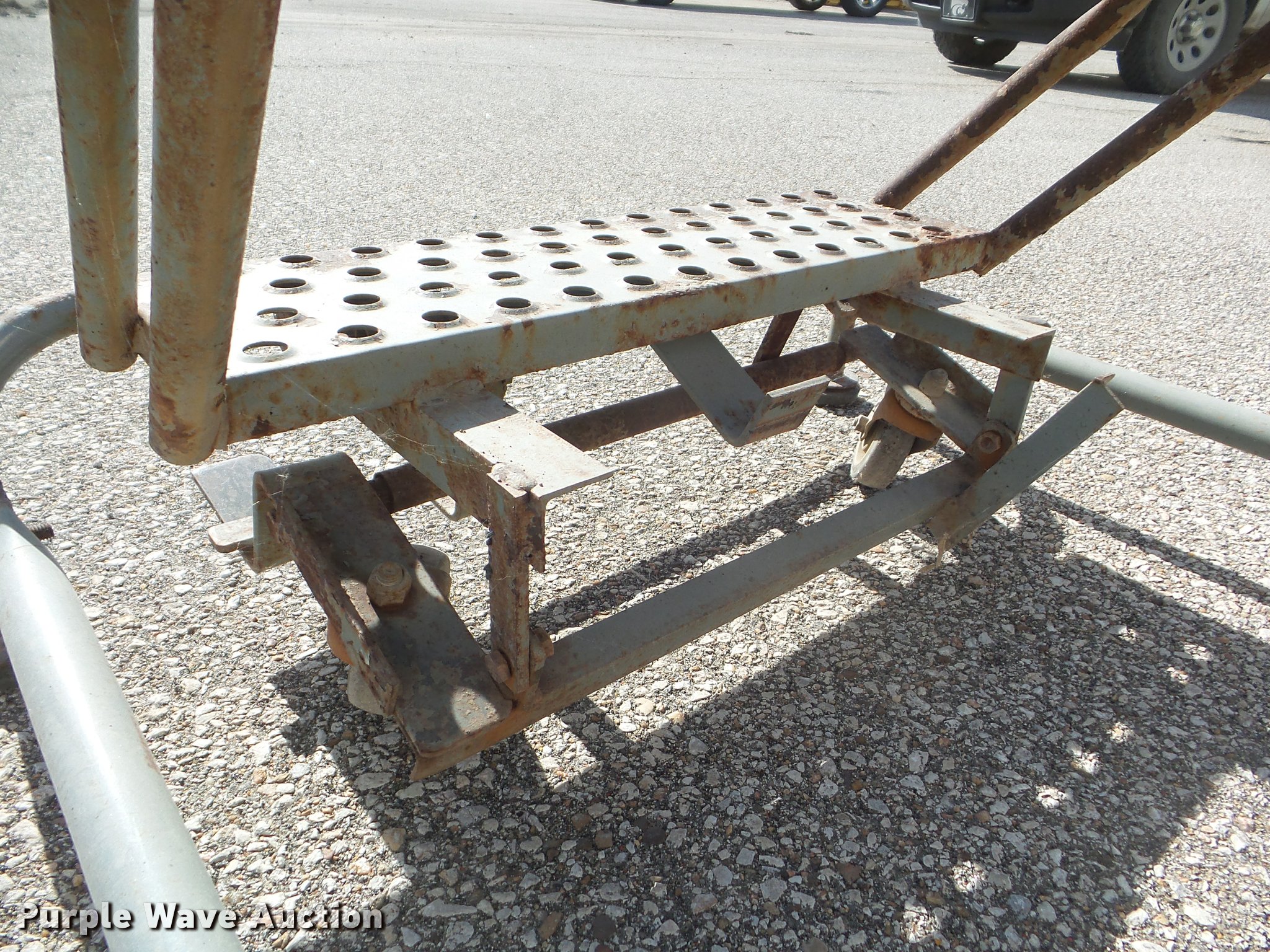 (2) steel ladders in Salina, KS | Item DA7708 sold | Purple Wave
