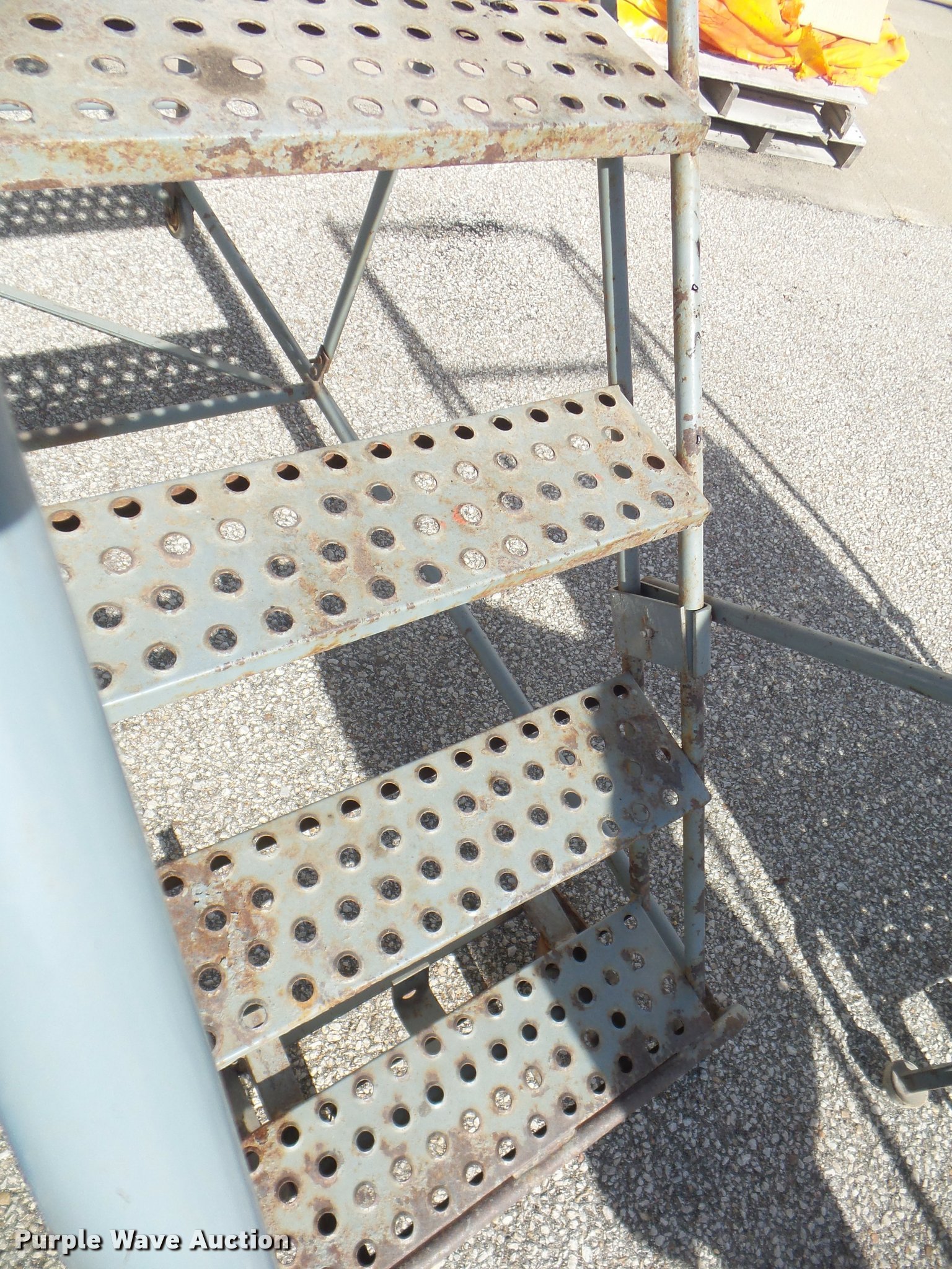 (2) steel ladders in Salina, KS | Item DA7708 sold | Purple Wave