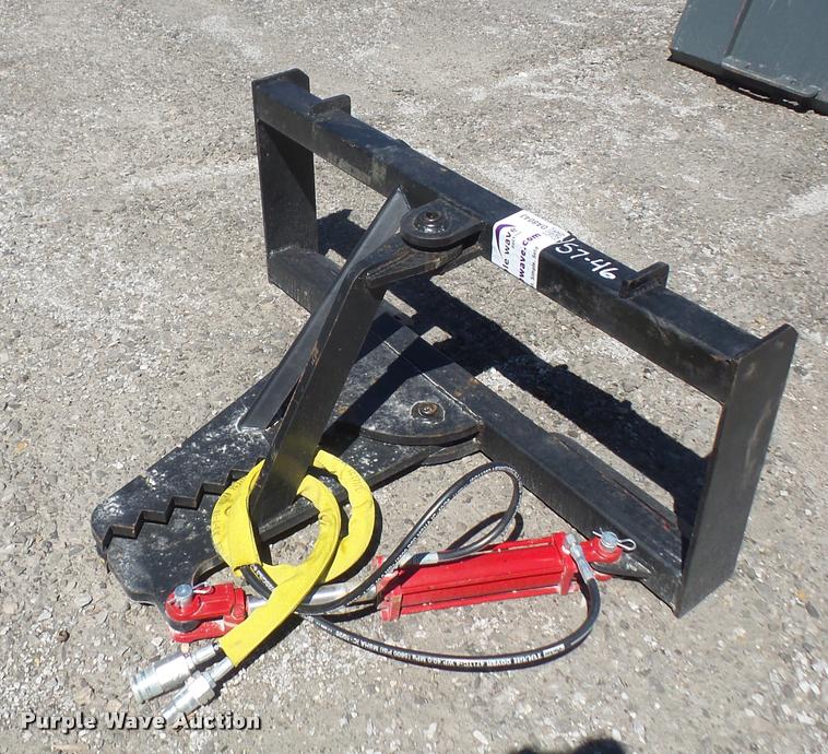 Skid steer post puller in Spring Hill, KS | Item DA8043 sold | Purple Wave