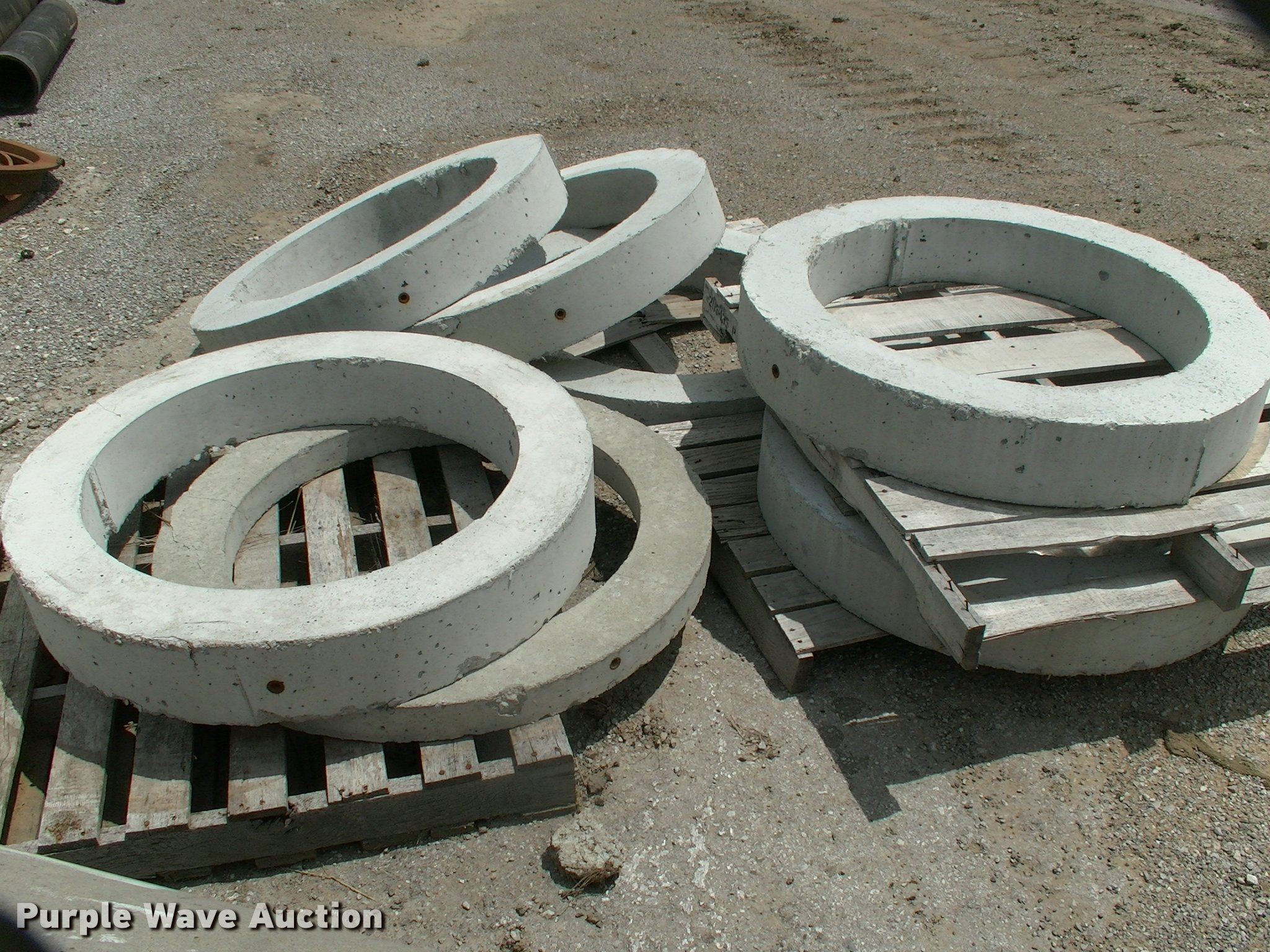 (7) concrete manhole rings in Tulsa, OK | Item DP9329 sold | Purple Wave
