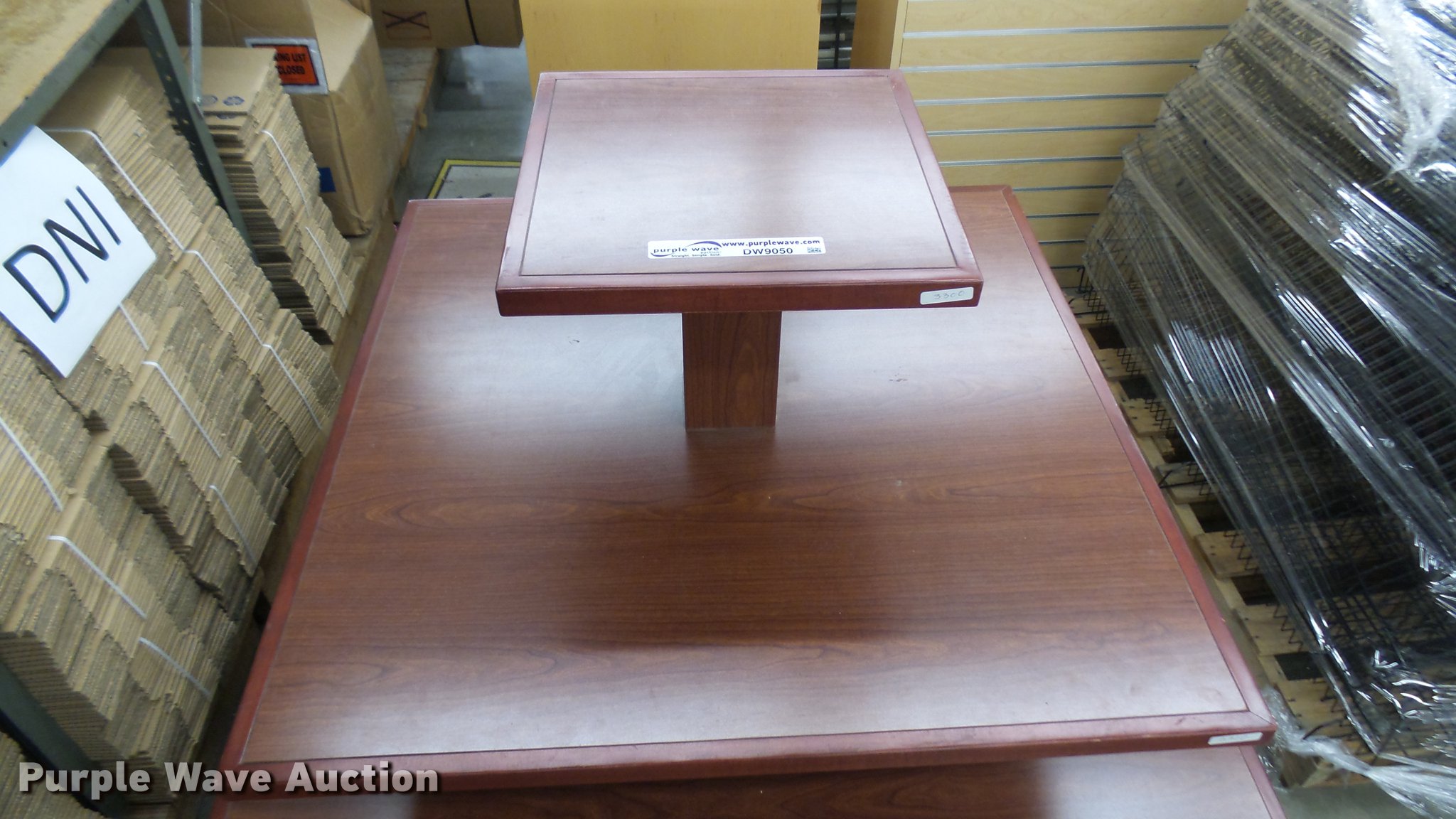 Wood retail display table in Wichita, KS | Item DW9050 sold | Purple Wave