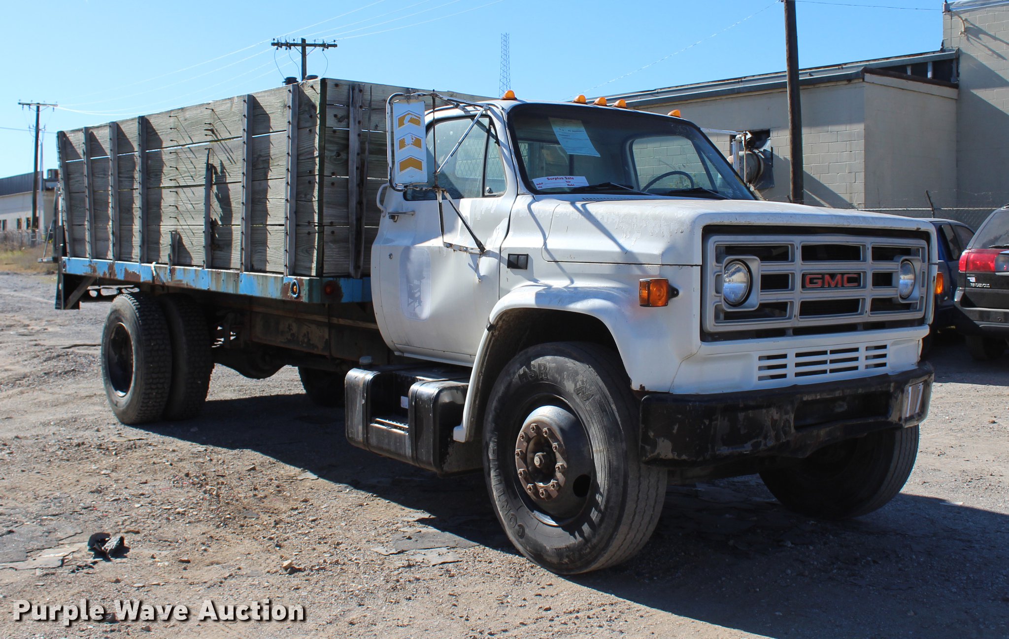 1988 GMC TopKick C70 flatbed truck in Tulsa, OK | Item BE9415 sold | Purple Wave