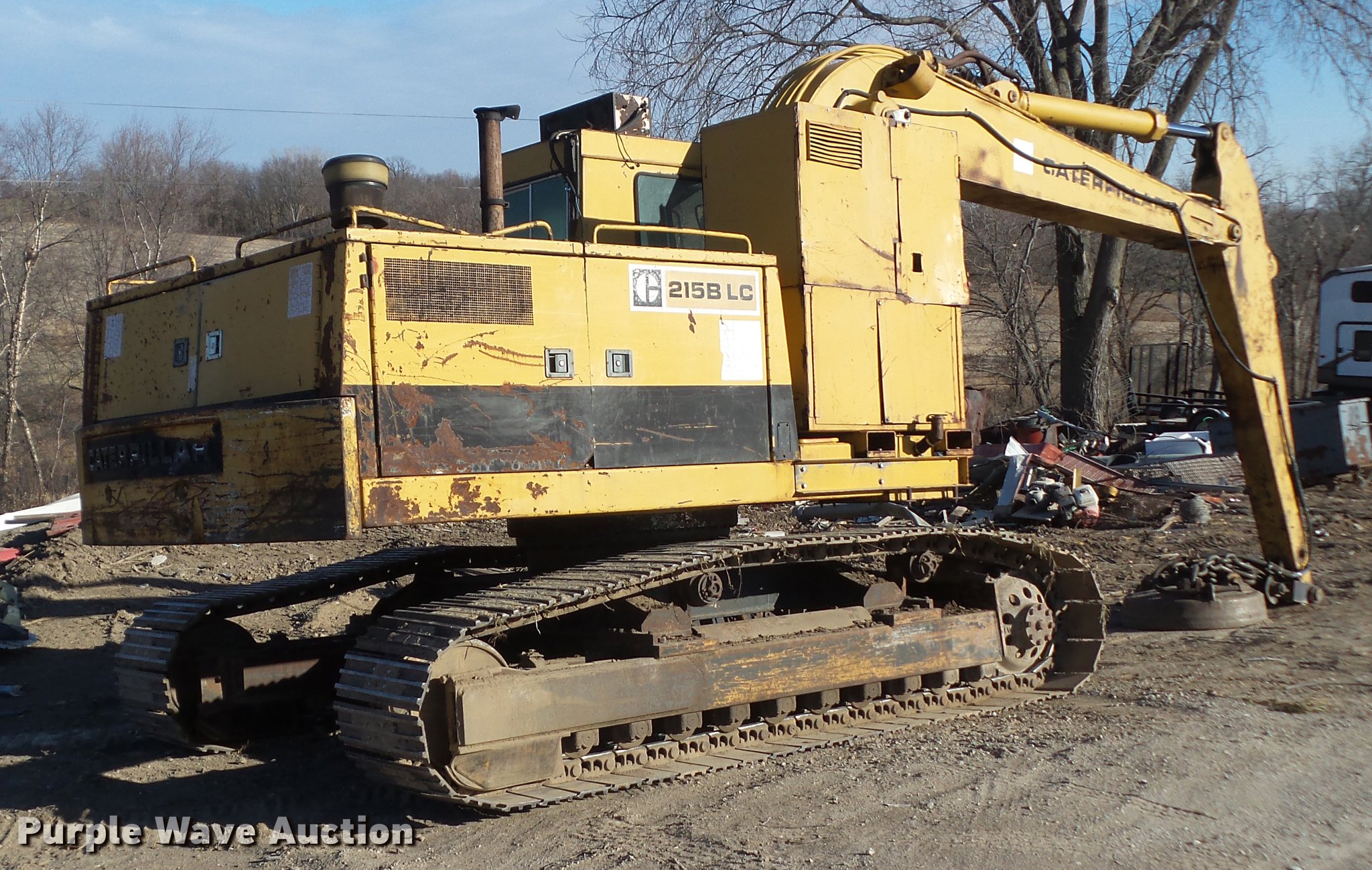 1986 Caterpillar 215B excavator in Plano, IA | Item L5644 sold | Purple ...