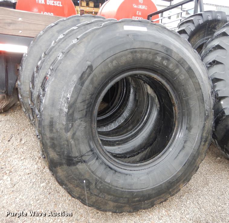 (3) 14.00R24 tires in Atchison, KS | Item EP9117 sold | Purple Wave
