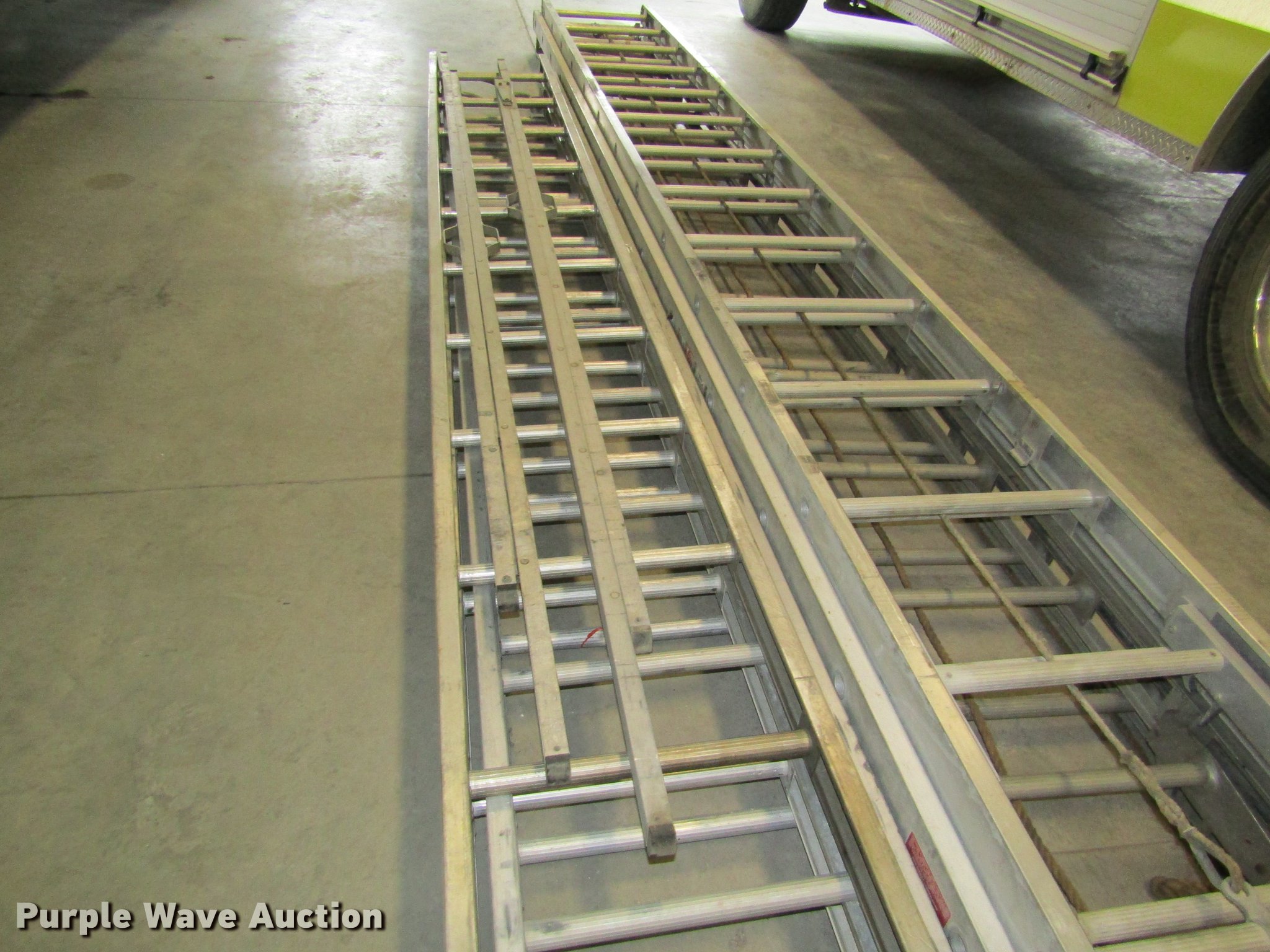 (8) ladders in Hays, KS | Item EI9273 sold | Purple Wave