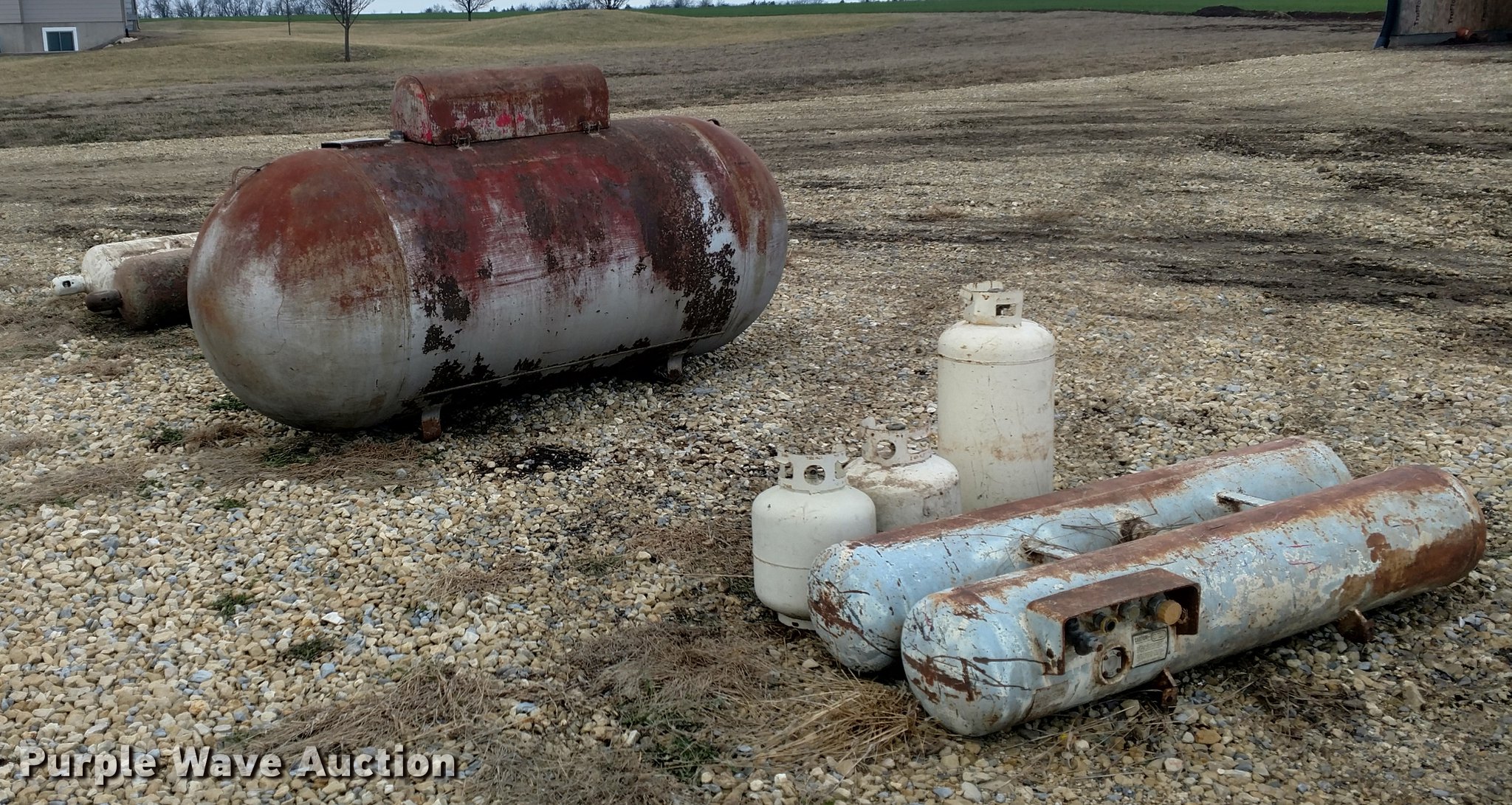 (7) propane tanks in El Dorado, KS | Item EJ9525 sold | Purple Wave