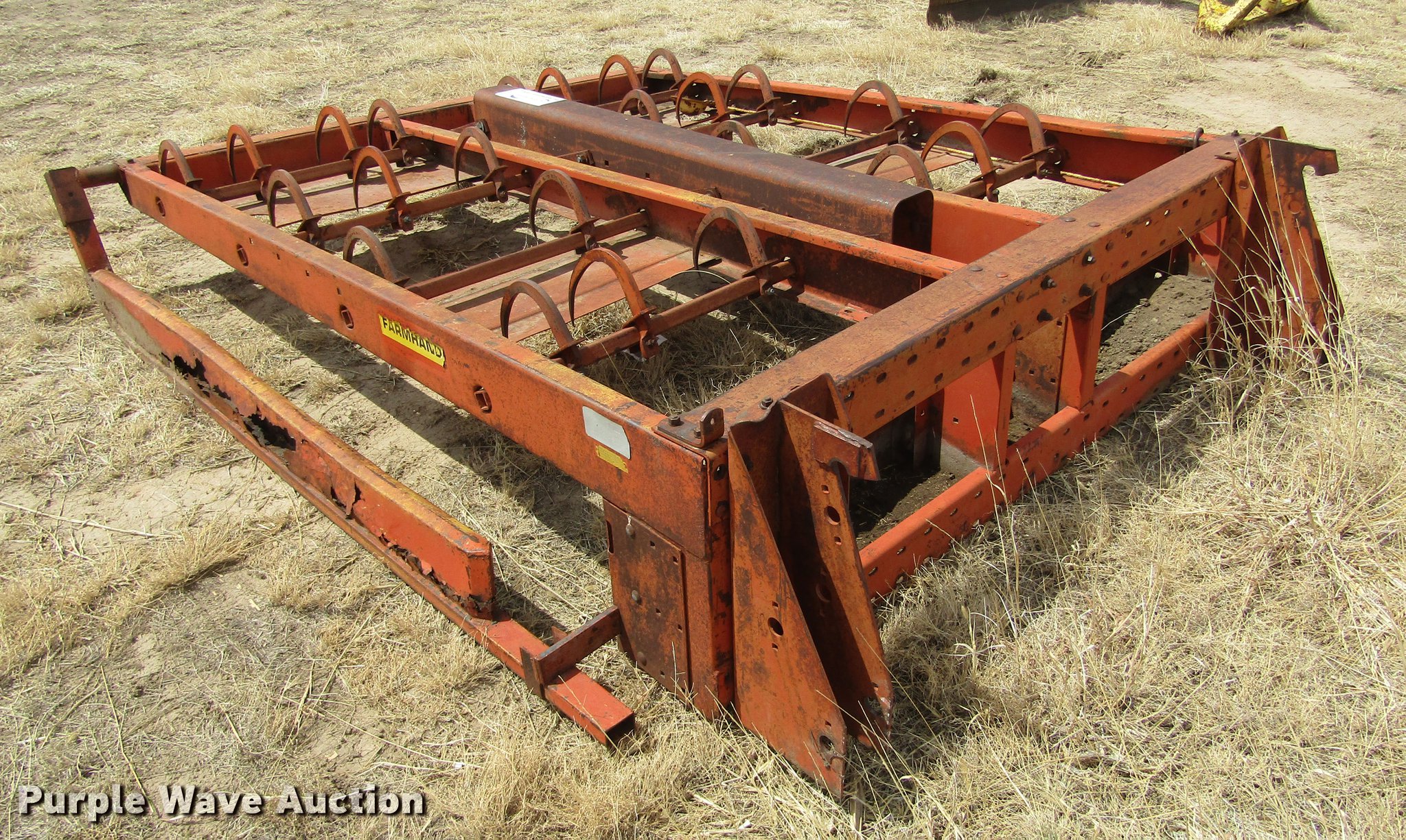 Farm Hand bale grabber in Sublette, KS | Item DE6750 sold | Purple Wave