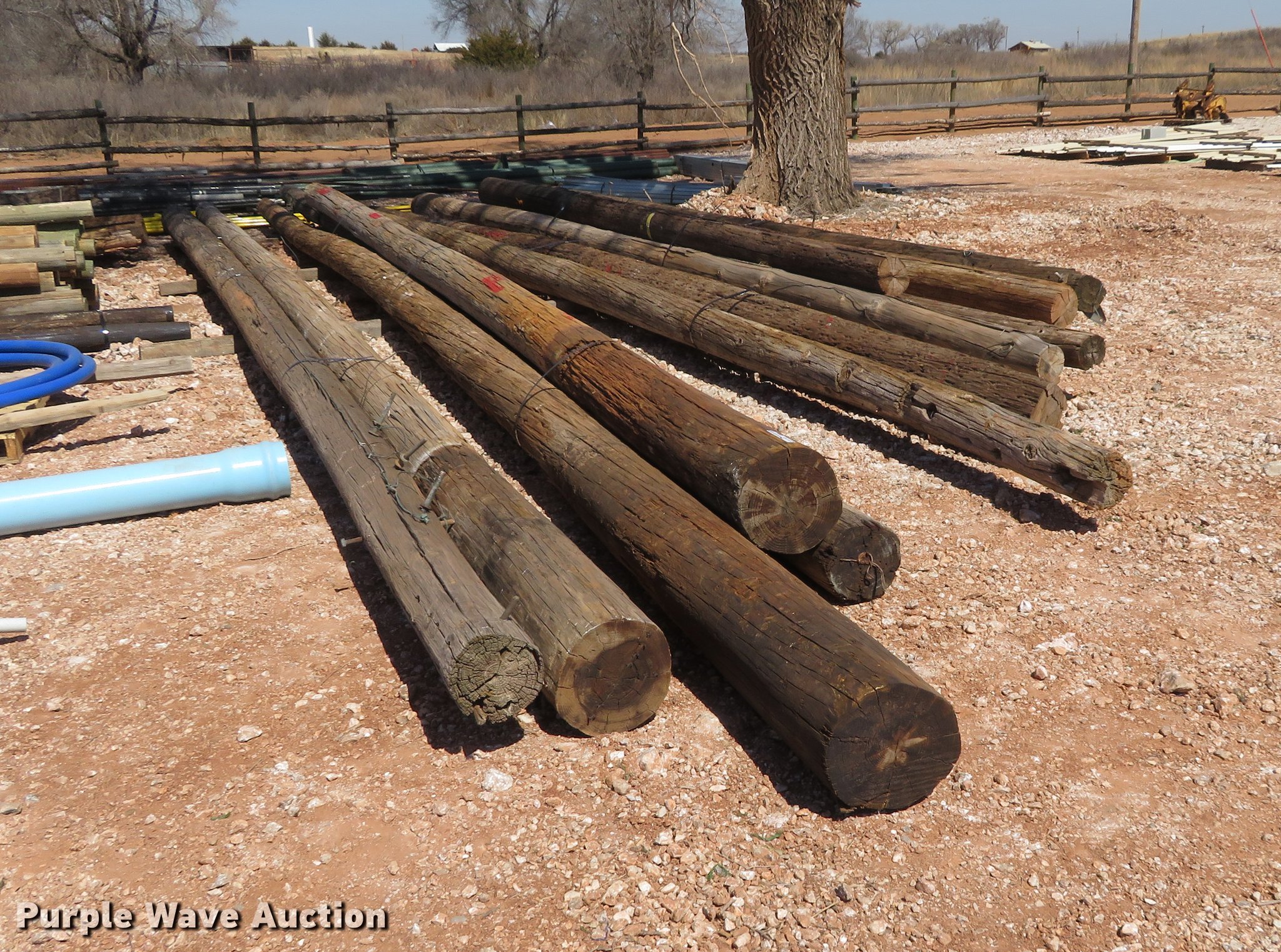 (5) bundles utility poles in Freedom, OK | Item DI9957 sold | Purple Wave