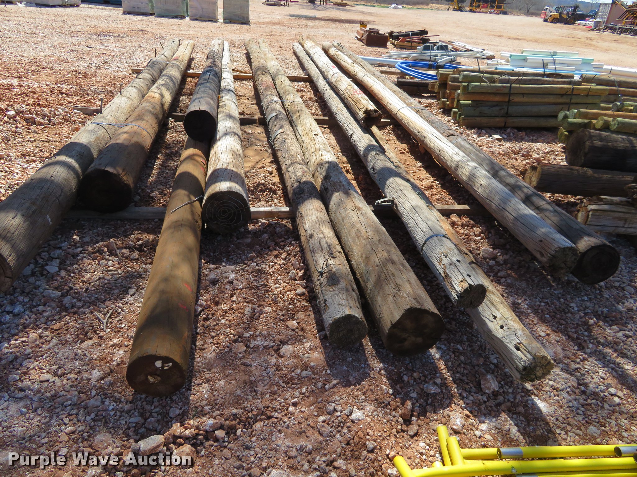 (5) bundles utility poles in Freedom, OK | Item DI9957 sold | Purple Wave