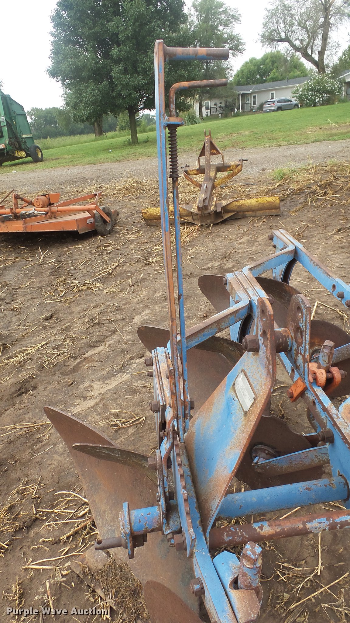 Ford three bottom plow in Mount Hope, KS | Item ES9364 sold | Purple Wave