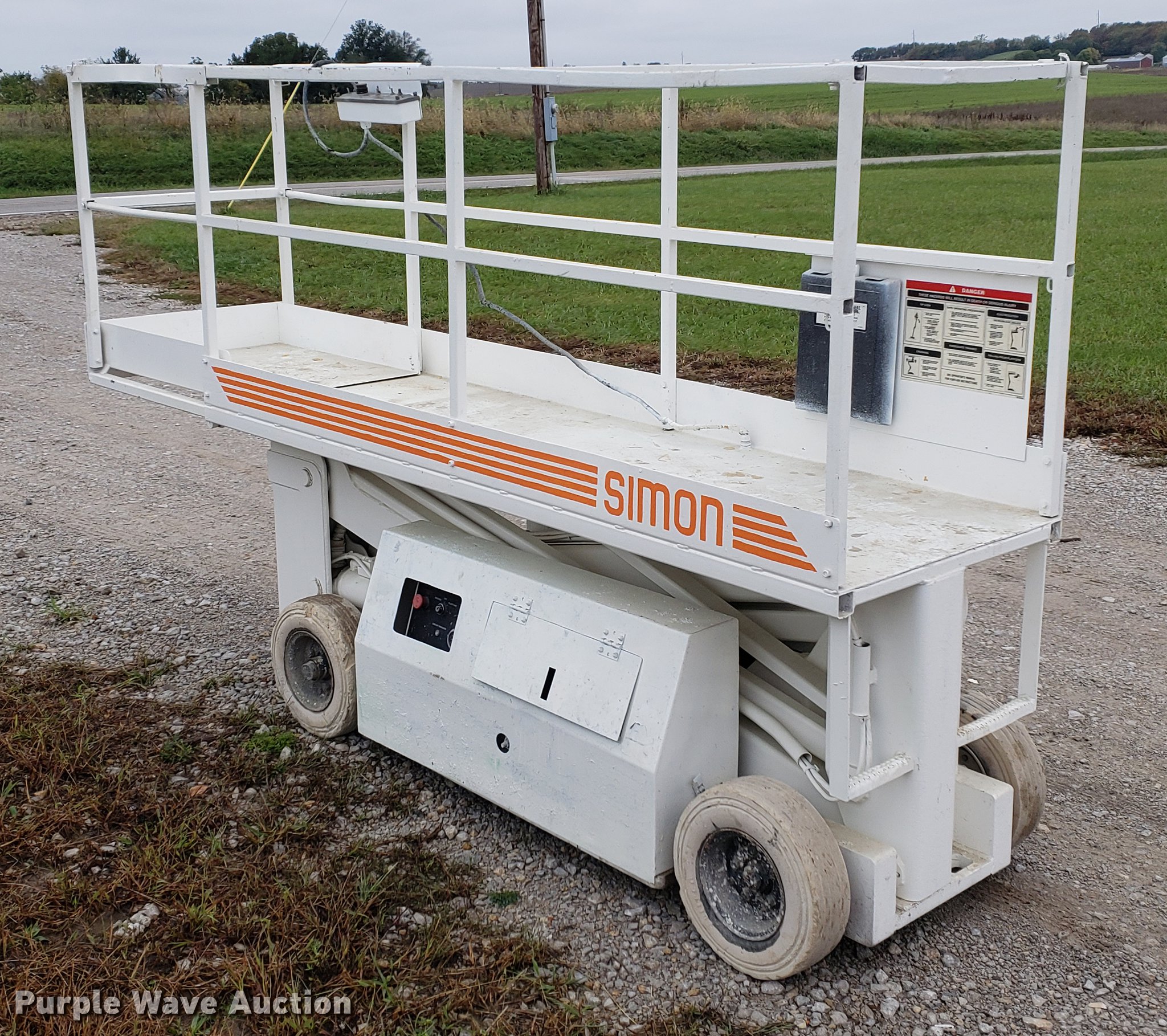 Simon L2034E scissor lift in Wellington, MO | Item EF9931 sold | Purple ...