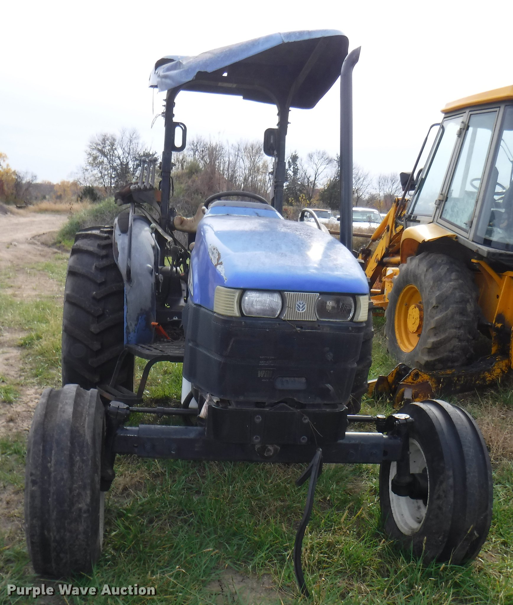 New Holland TN70 tractor in Topeka, KS | Item DF1987 sold | Purple Wave