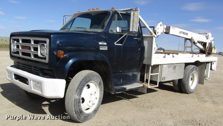 1977 GMC 6000 flatbed truck with crane in Plainville, KS | Item DB4885 sold | Purple Wave