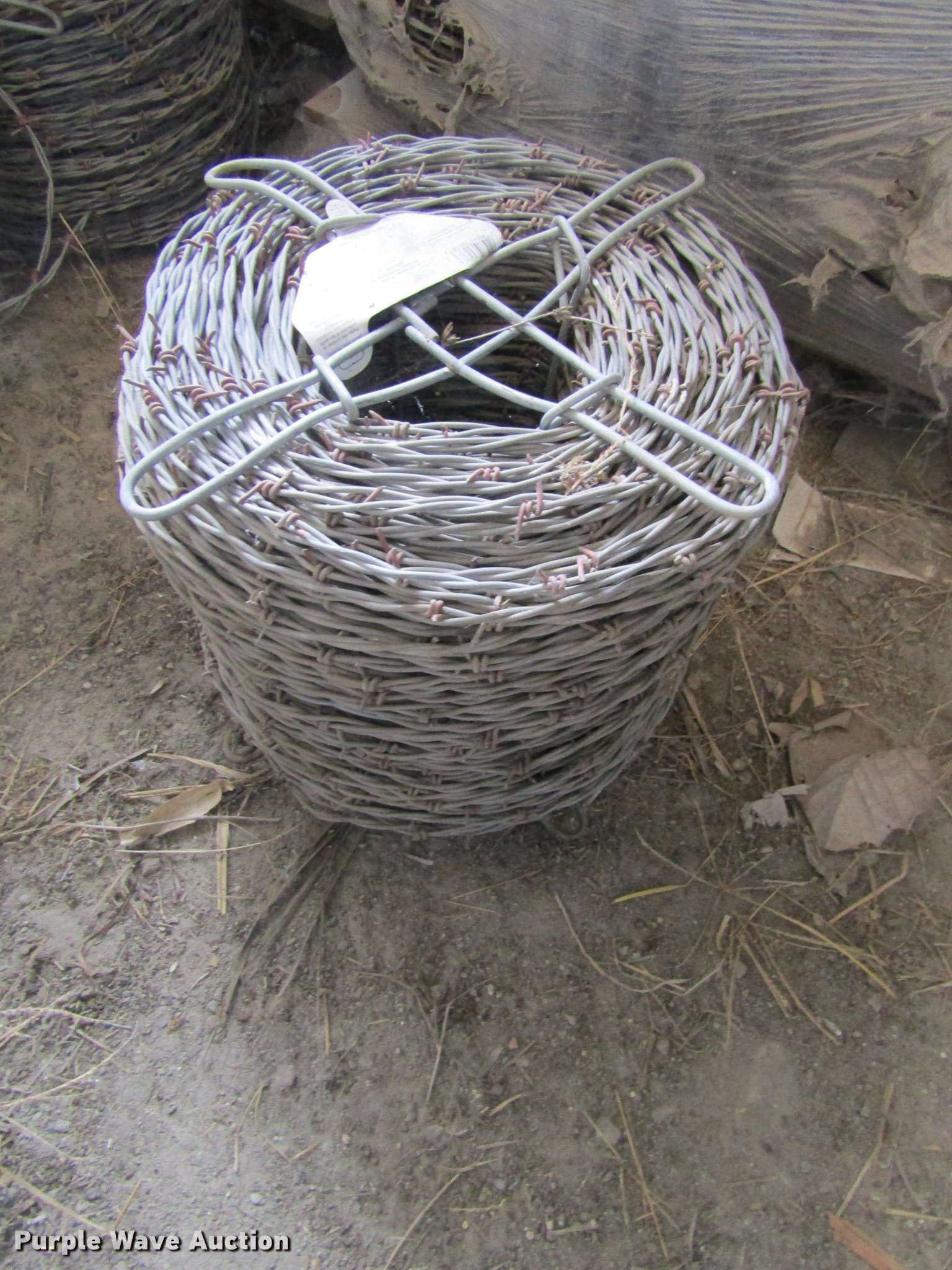 (27) rolls Red barb wire in Plainville, KS | Item EH9338 sold | Purple Wave