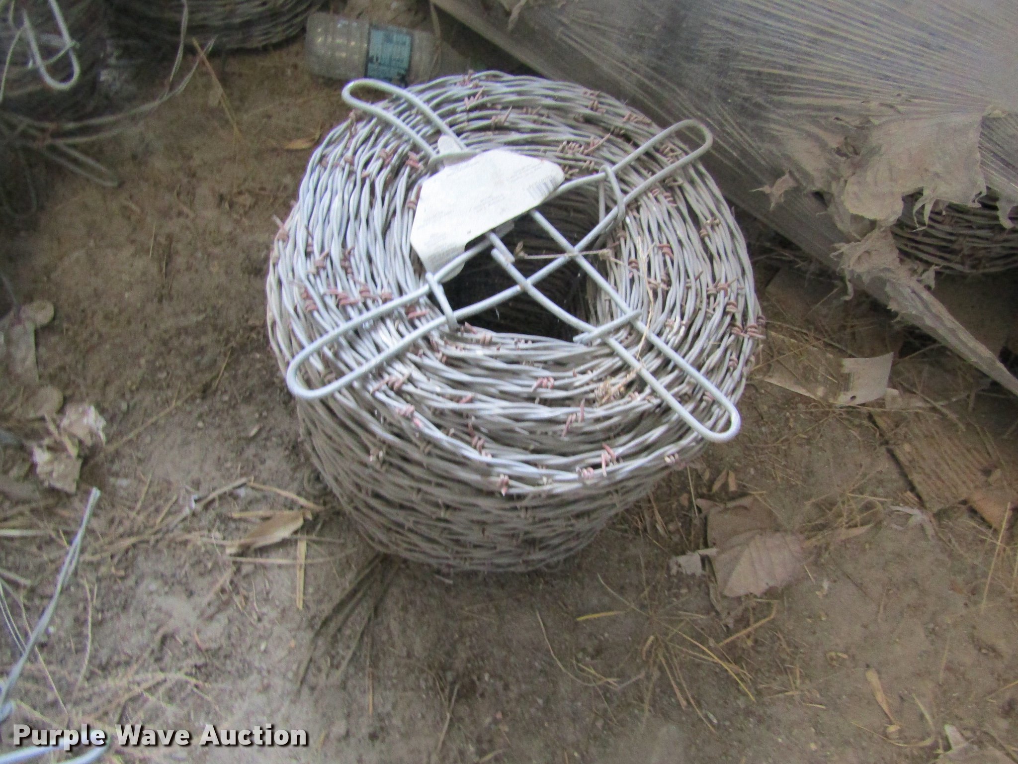 (27) rolls Red barb wire in Plainville, KS | Item EH9338 sold | Purple Wave