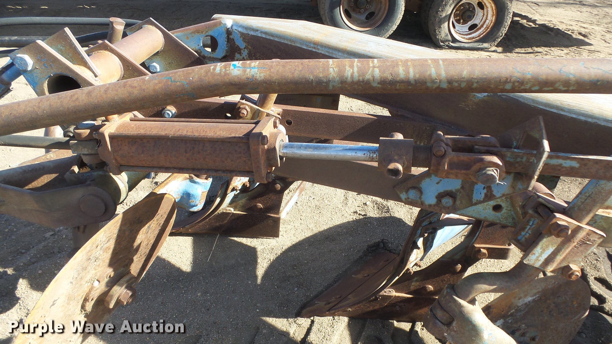 Ford 118 four bottom plow in Kinsley, KS | Item FI9397 sold | Purple Wave