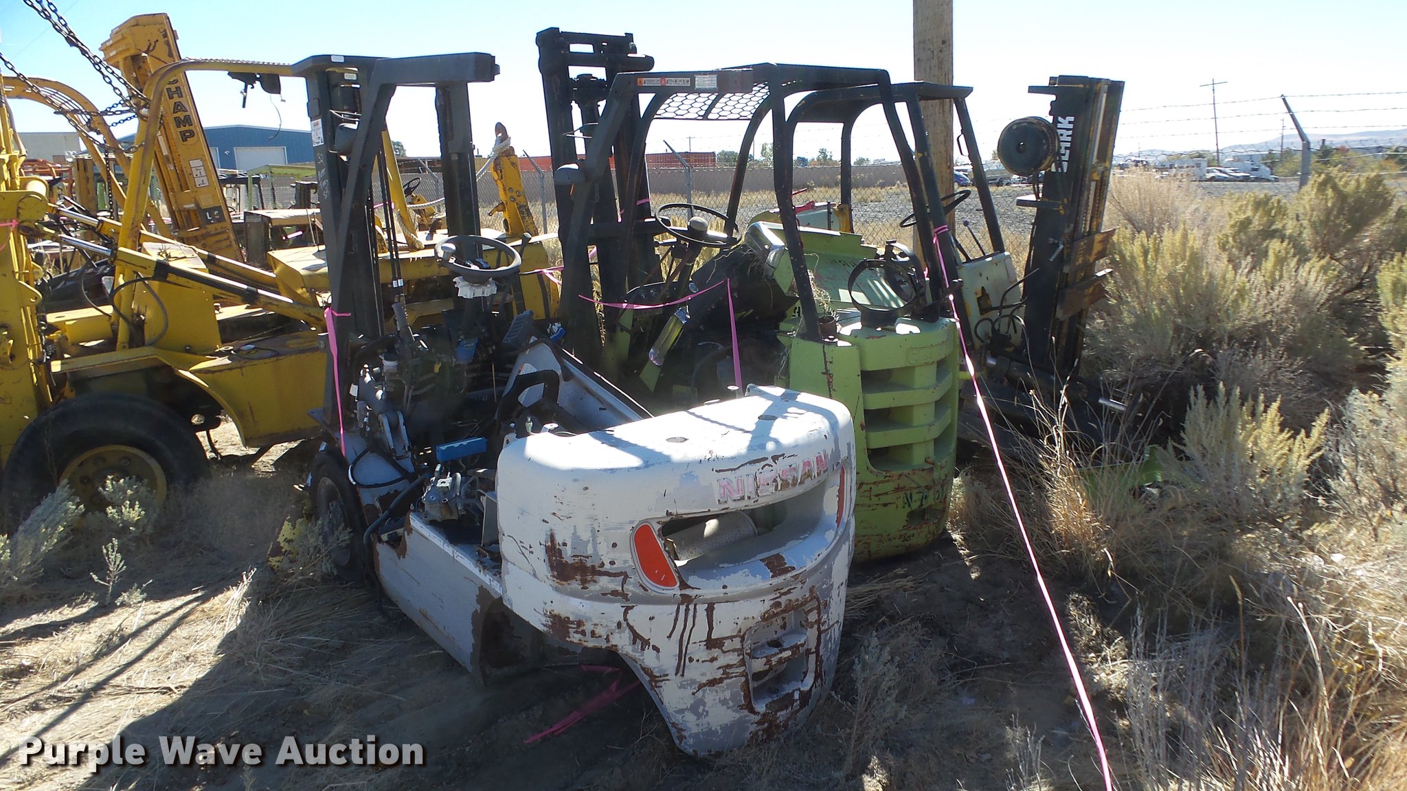 (3) salvage forklifts in Reno, NV | Item FS9799 sold | Purple Wave
