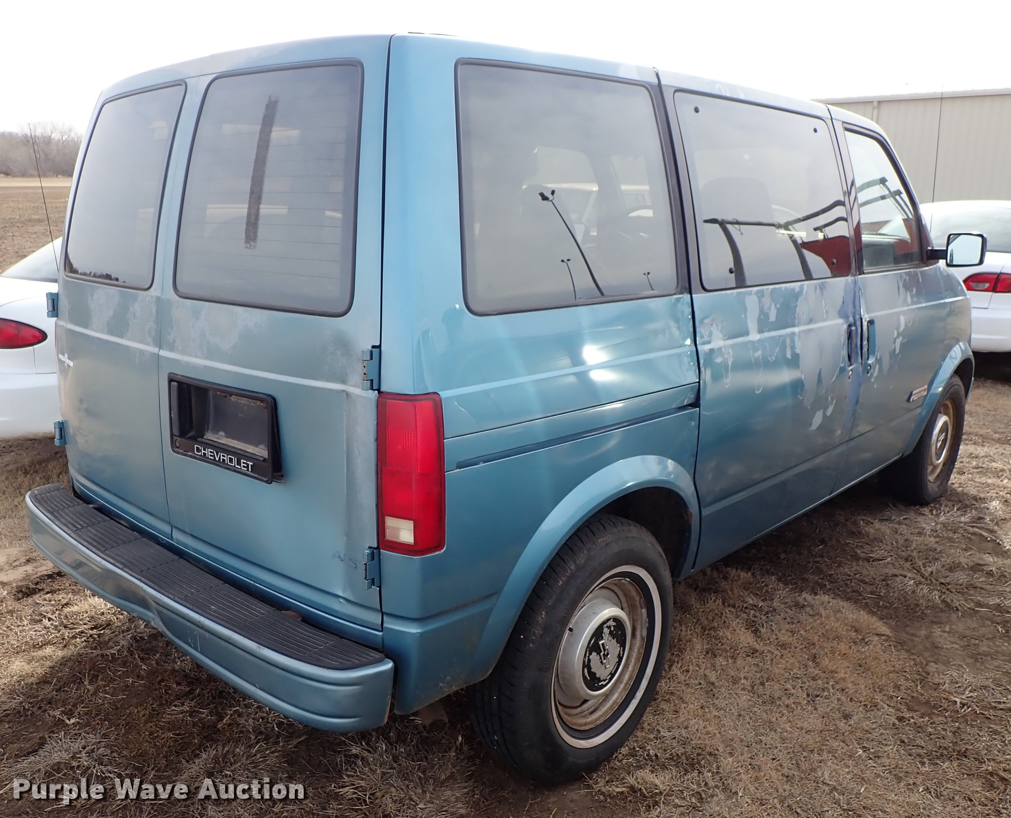 1992 Chevrolet Astro van in Larned, KS | Item DF8711 sold | Purple Wave