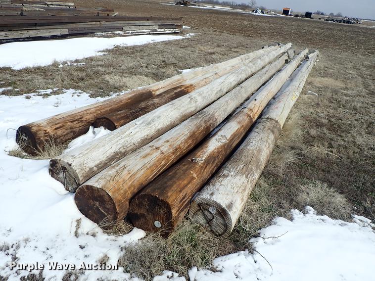 (10) wood poles in Larned, KS | Item FH9723 sold | Purple Wave
