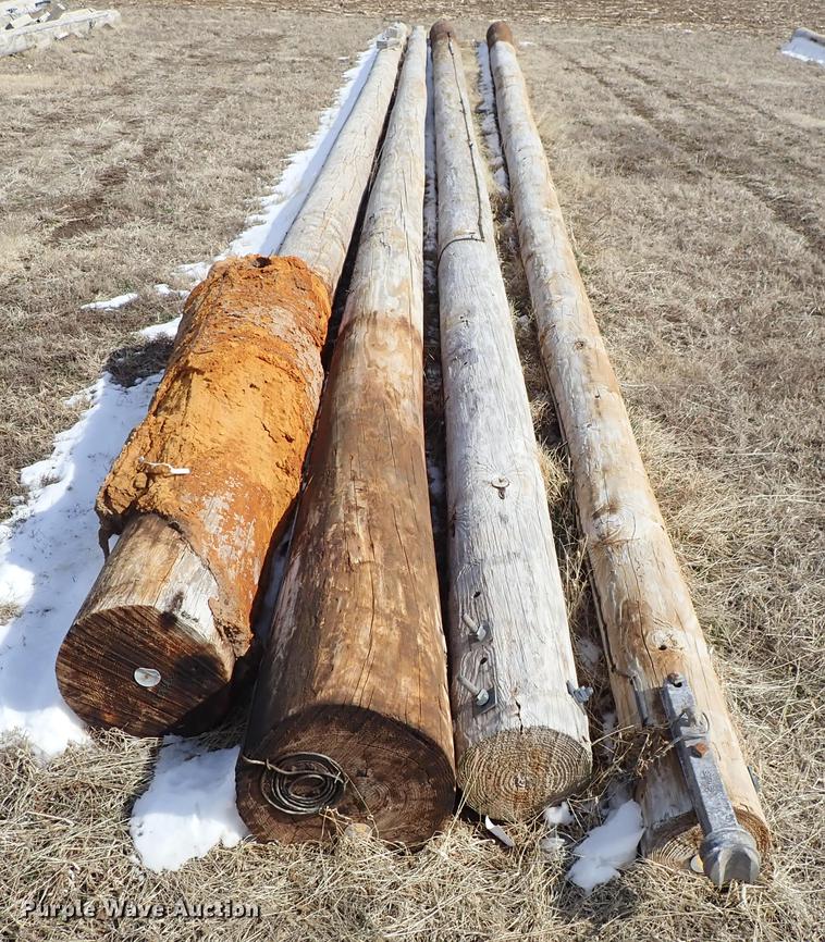 (10) wood poles in Larned, KS | Item FH9723 sold | Purple Wave
