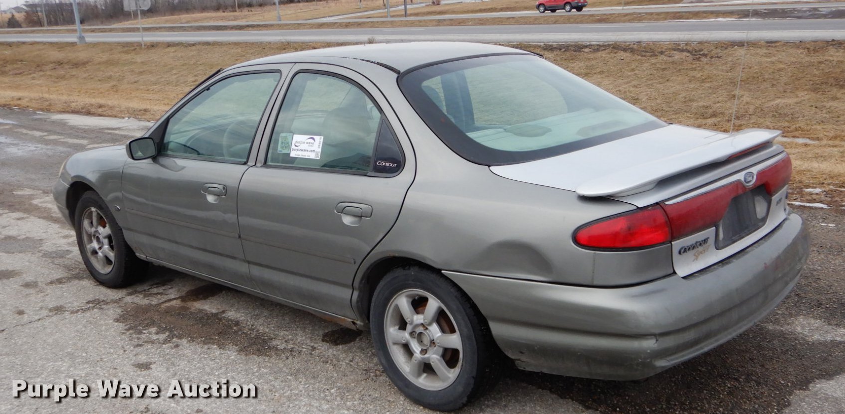 1998 Ford Contour SE in Cameron, MO | Item DE6010 sold | Purple Wave