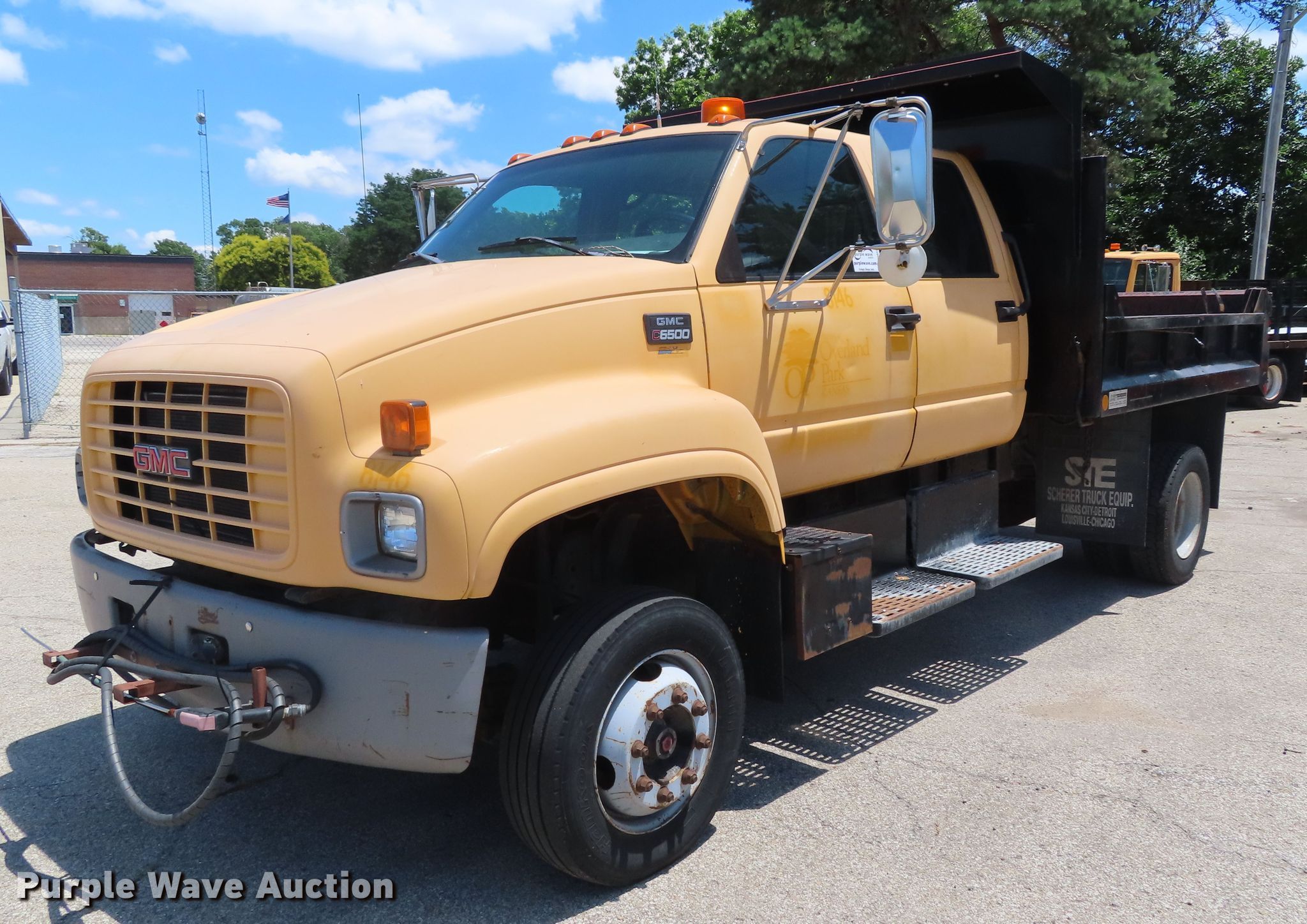 1997 GMC C6500 Crew Cab dump truck in Overland Park, KS | Item DD6224 sold | Purple Wave