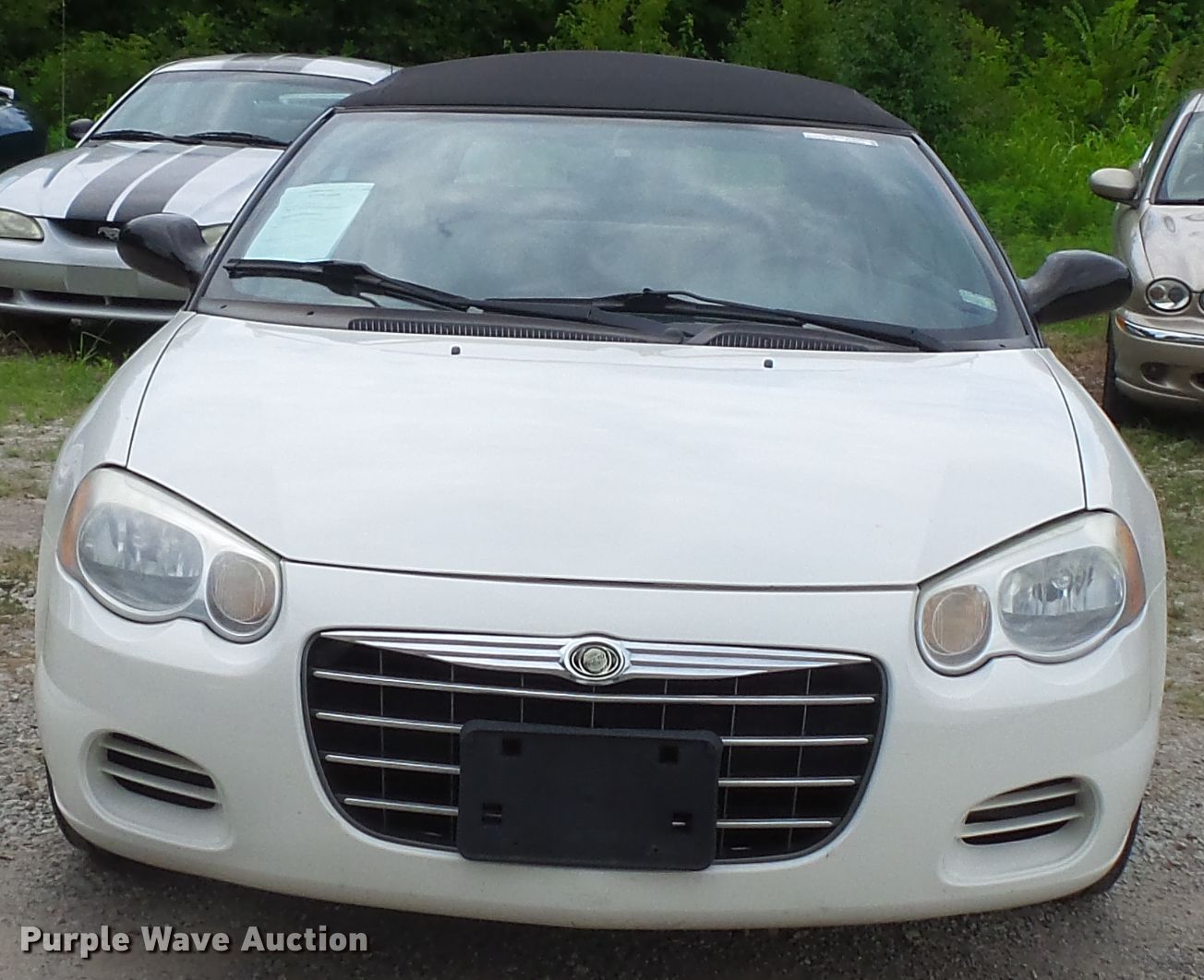 2005 Chrysler Sebring convertible in Buckner, MO | Item FM9654 sold | Purple Wave