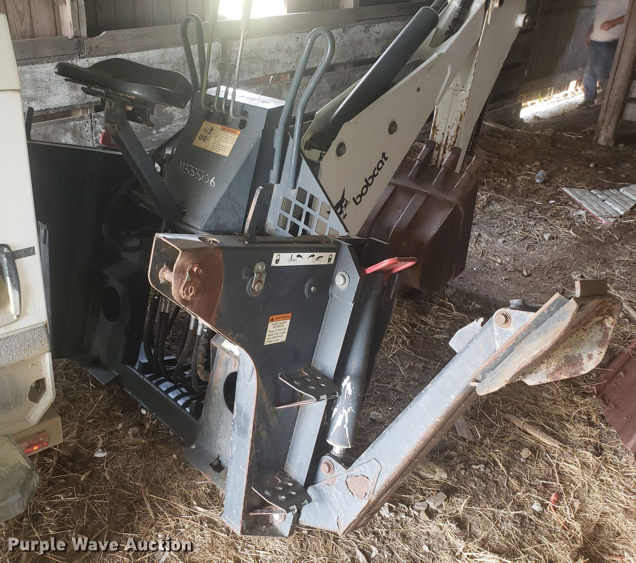 Bobcat 811 skid steer backhoe in Holden, MO | Item GF9257 sold | Purple ...