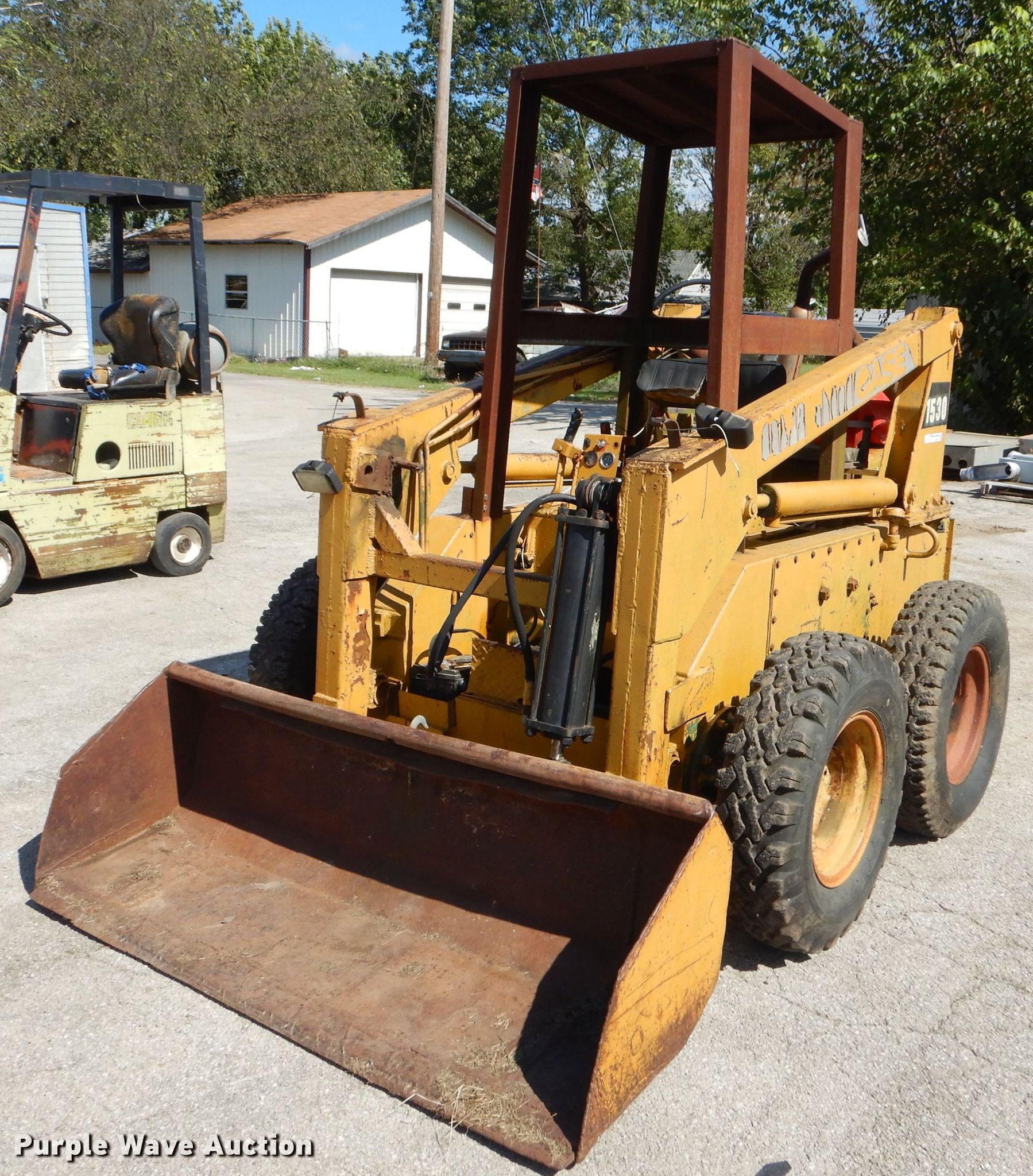 Case 1530 skid steer in Caney, KS | Item EY9264 sold | Purple Wave
