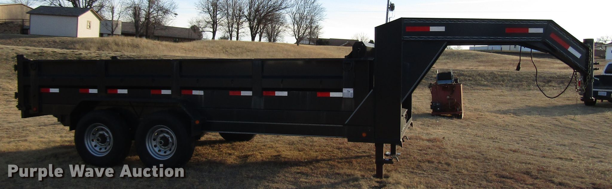 2013 Lamar dump trailer in Woodward, OK | Item DH8316 sold | Purple Wave