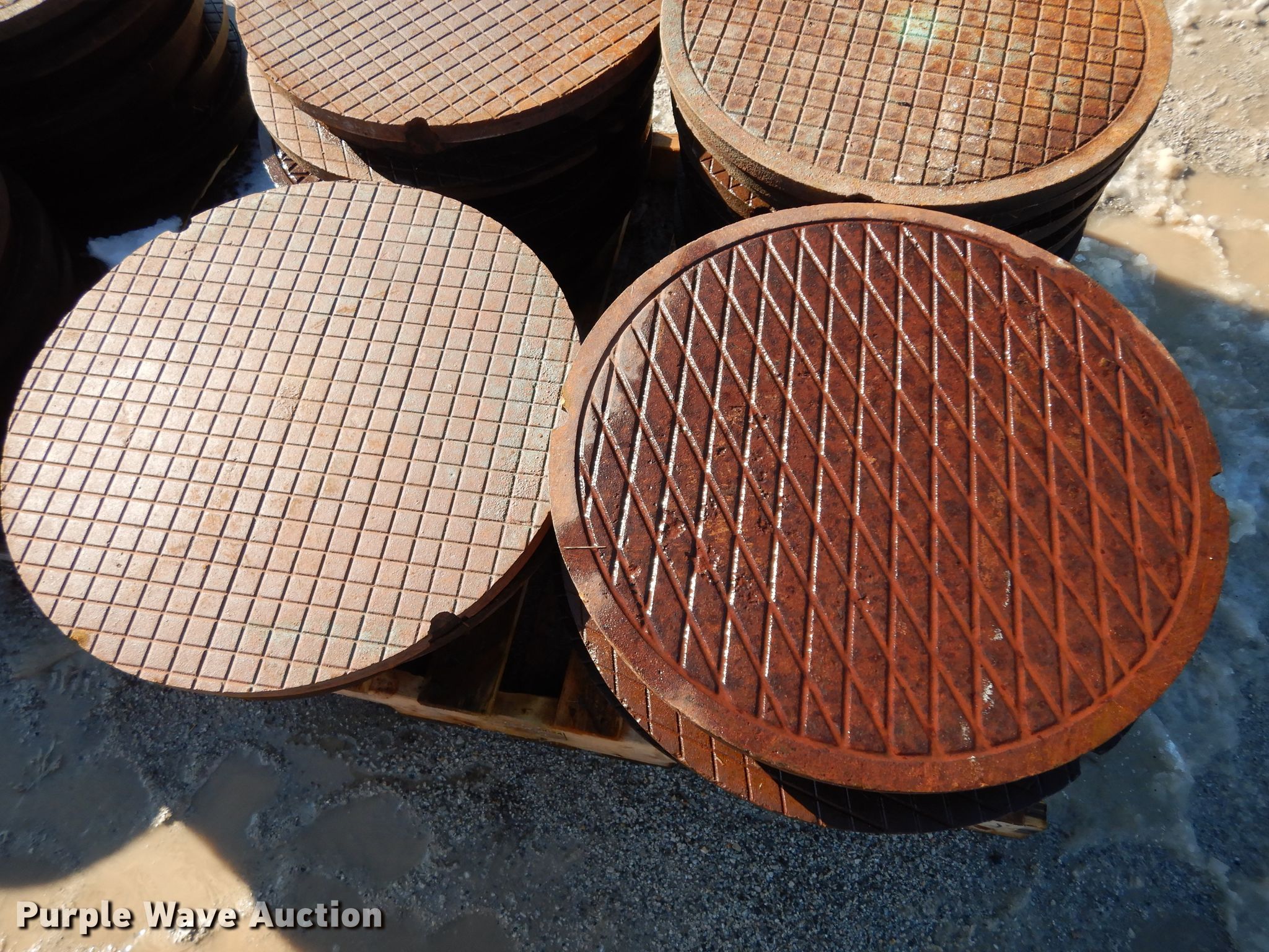 (40) 22" water main lids in Leawood, KS | Item FY9296 sold | Purple Wave