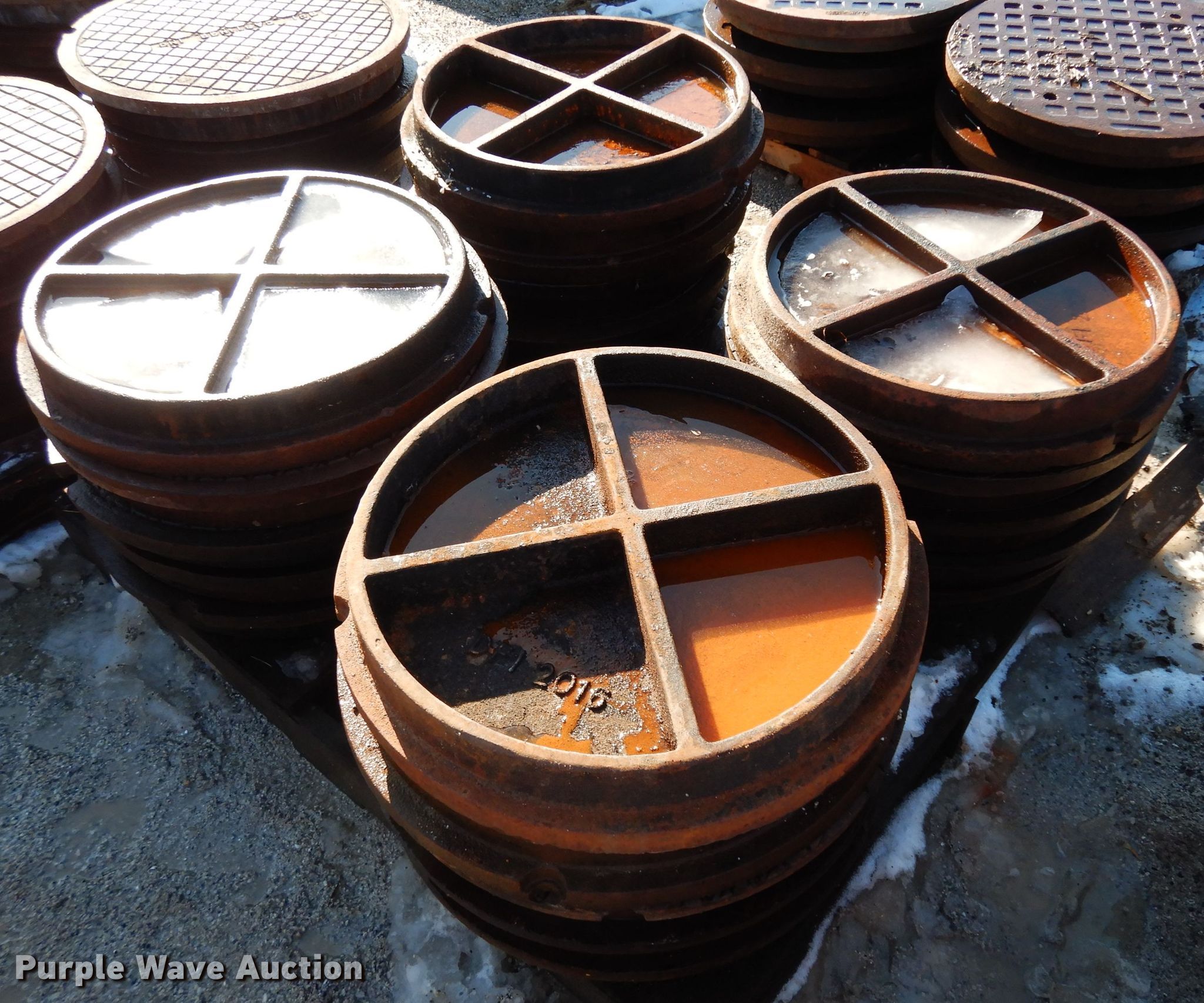 (40) 22" water main lids in Leawood, KS | Item FY9296 sold | Purple Wave