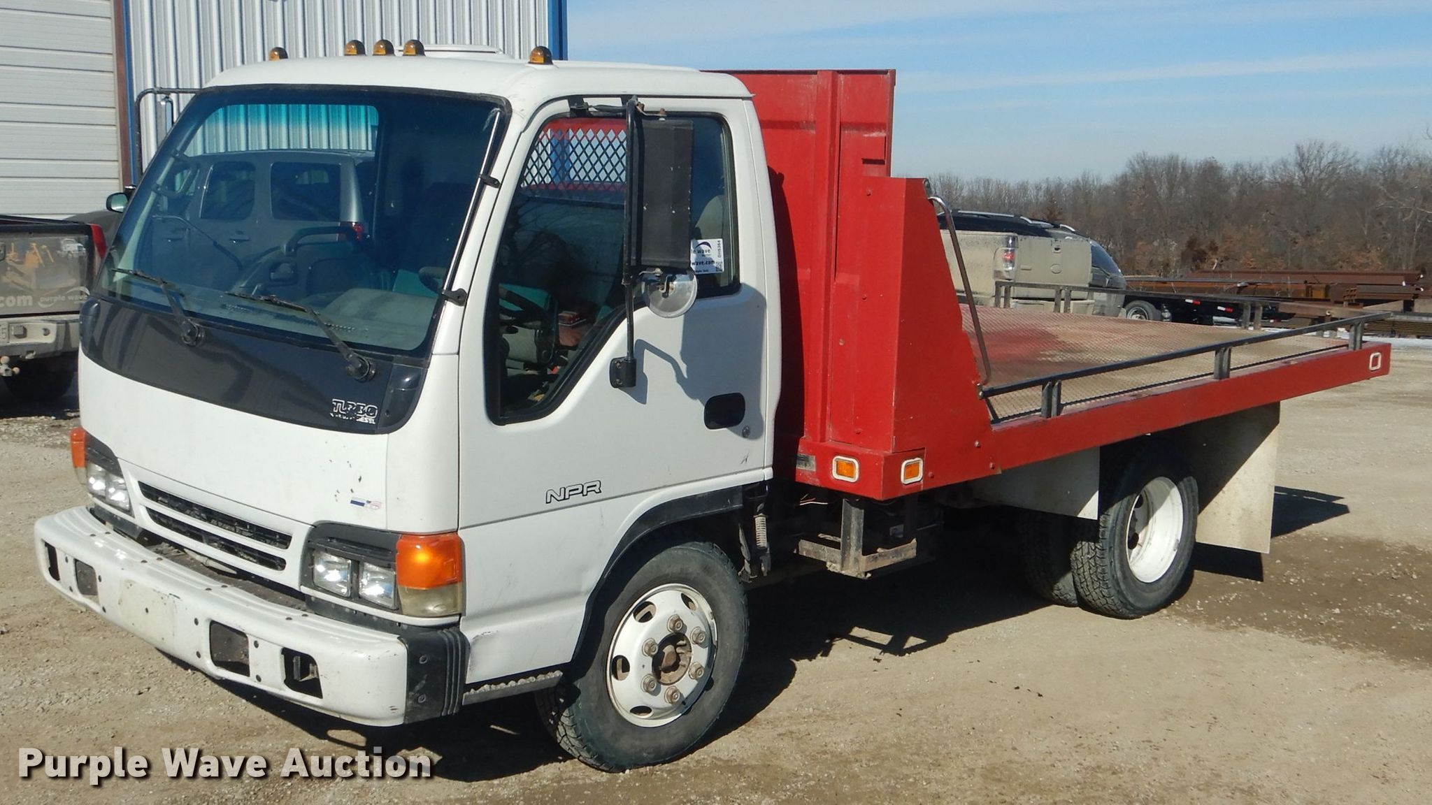 1995 Isuzu NPR flatbed truck in Bethany, MO | Item DH6364 sold | Purple Wave