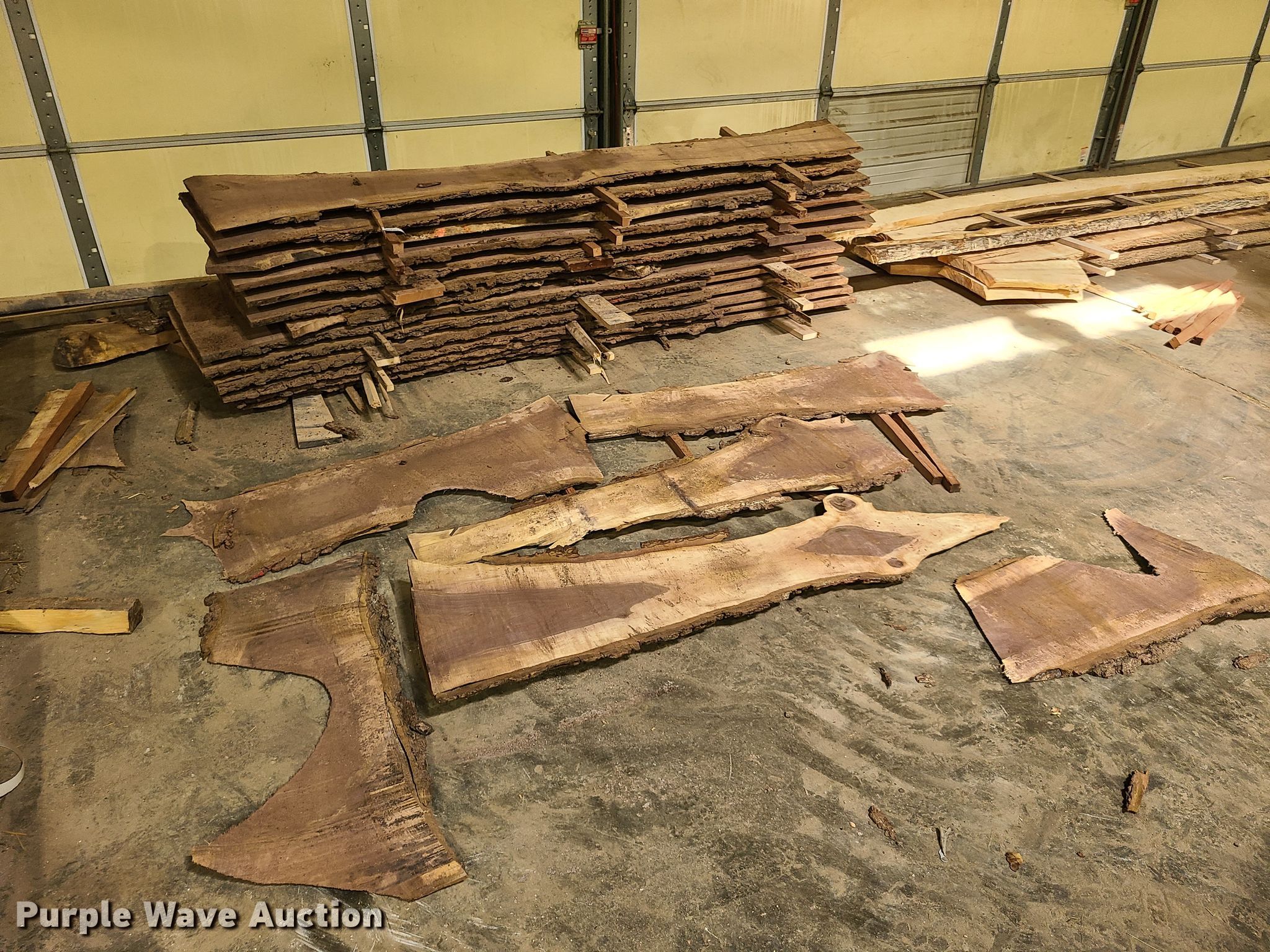 Rough cut walnut slabs in Kansas City, MO | Item GX9269 sold | Purple Wave