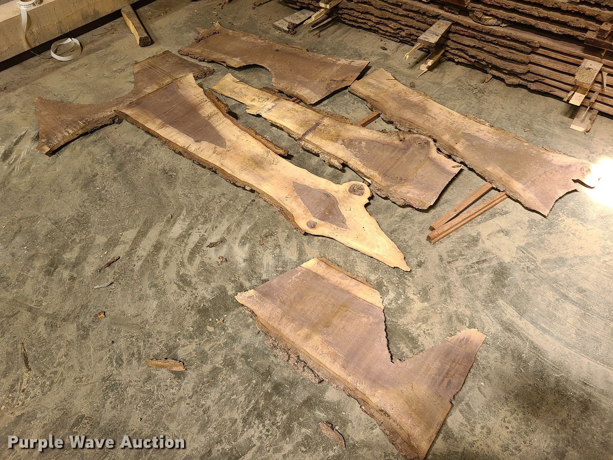 Rough cut walnut slabs in Kansas City, MO | Item GX9269 sold | Purple Wave