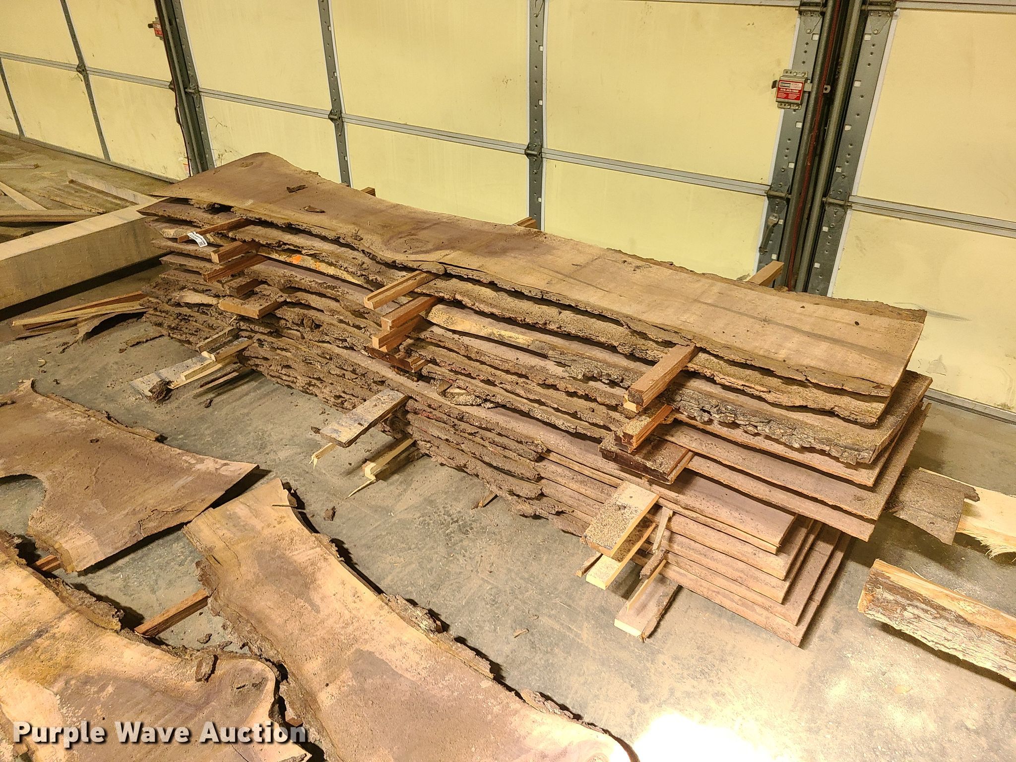 Rough cut walnut slabs in Kansas City, MO | Item GX9269 sold | Purple Wave