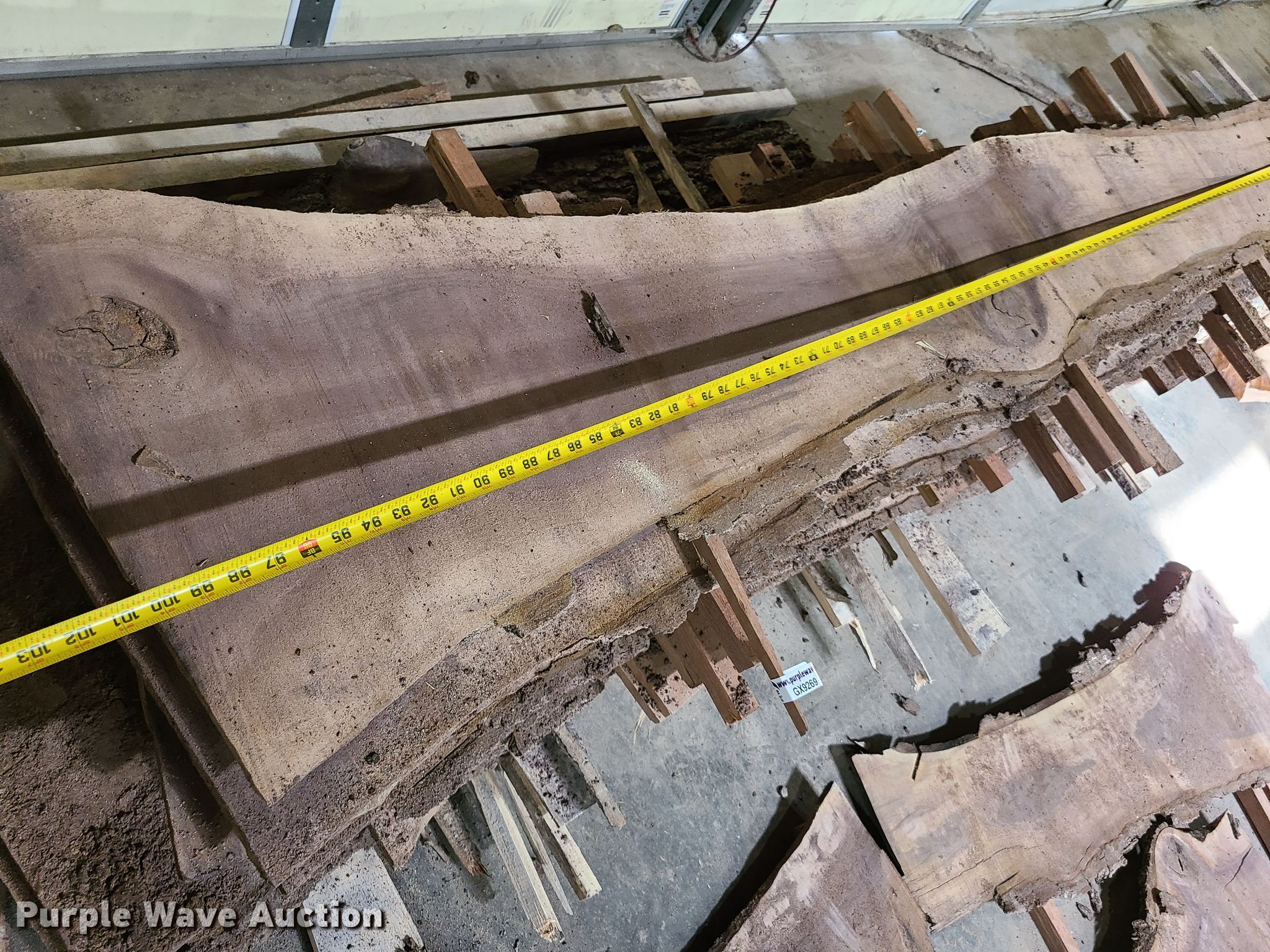 Rough cut walnut slabs in Kansas City, MO | Item GX9269 sold | Purple Wave