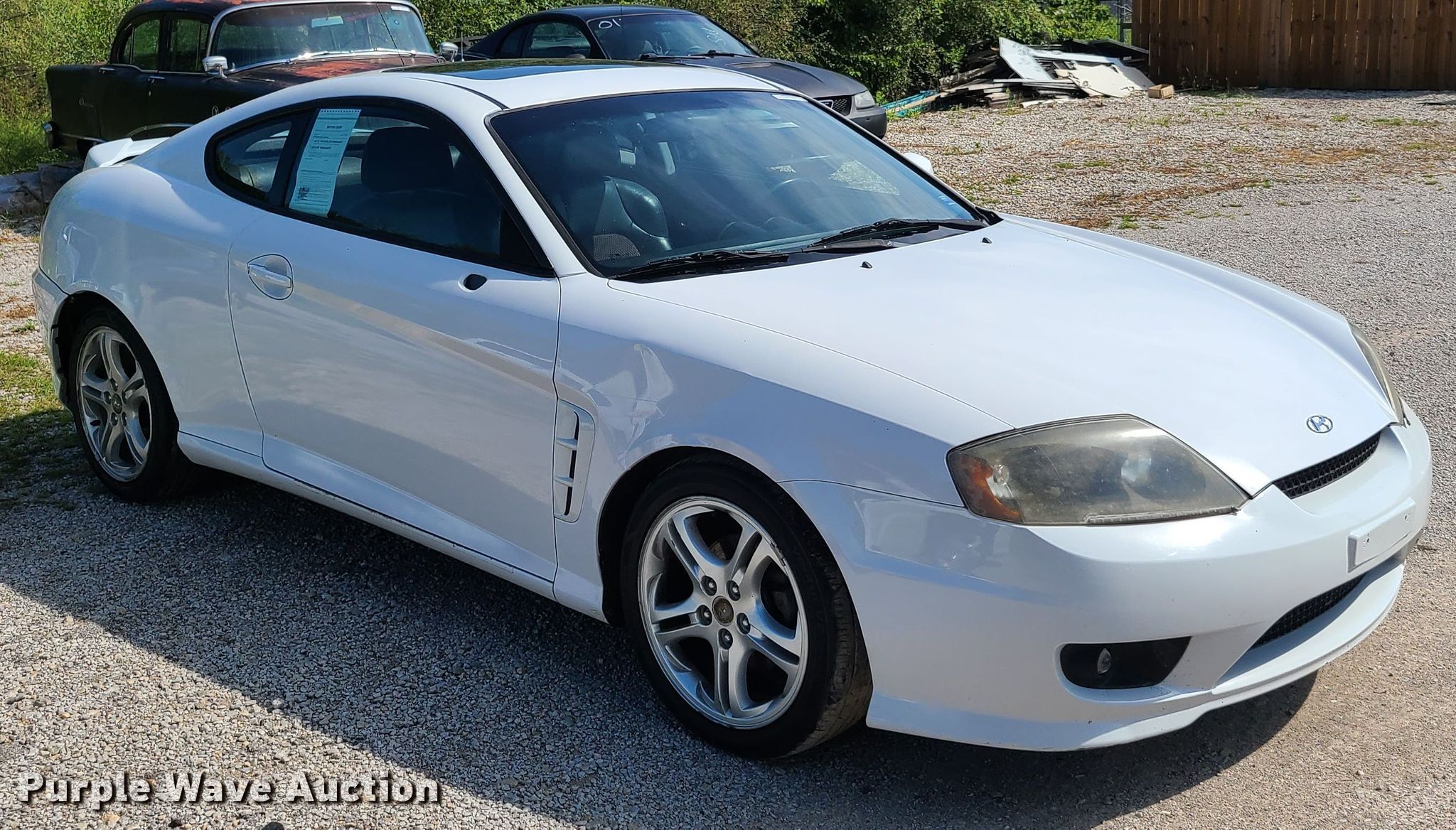 2006 Hyundai Tiburon in Buckner, MO | Item GY9549 sold | Purple Wave