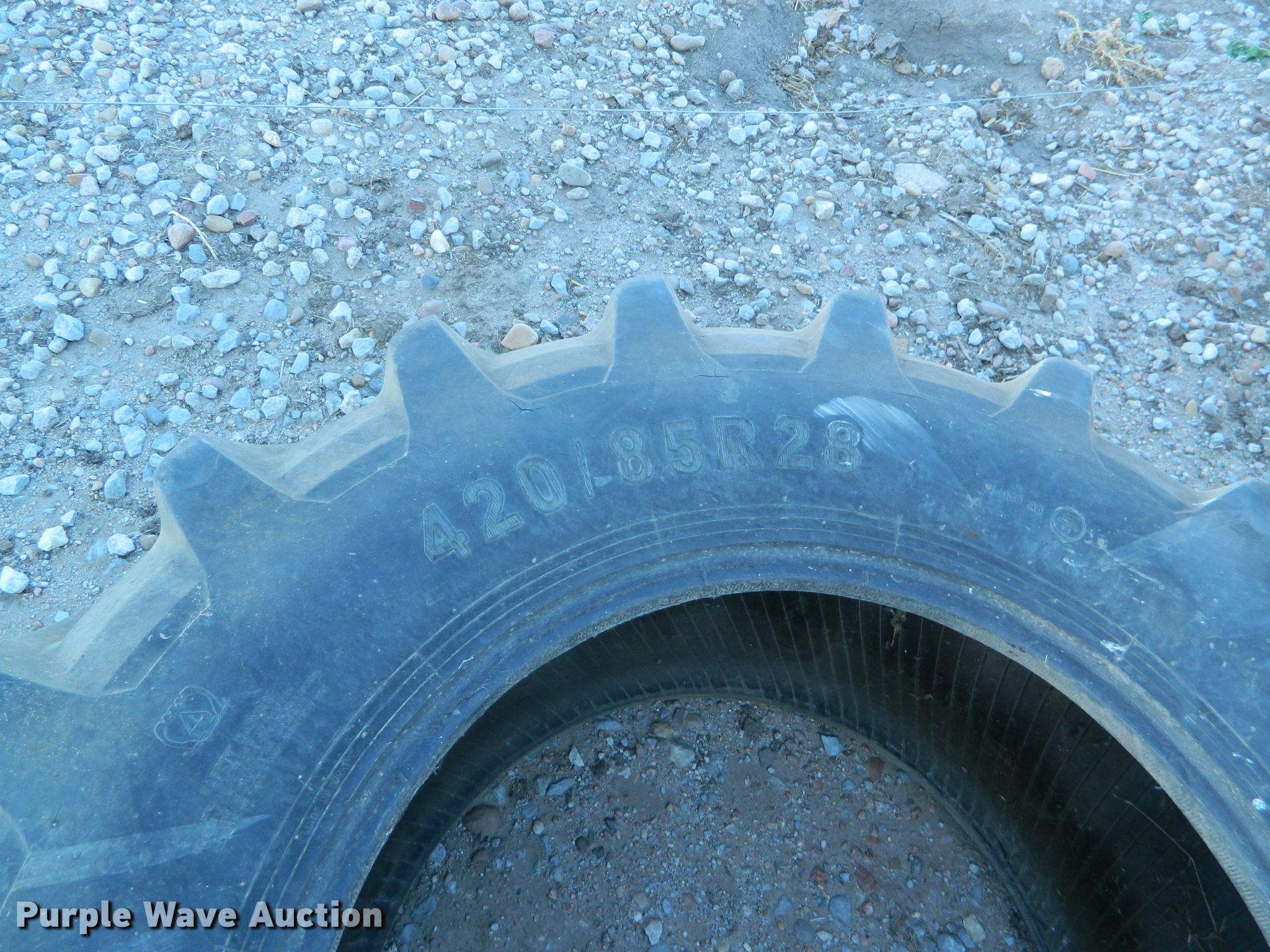420/85R28 lug tire in Ellinwood, KS | Item DF4638 sold | Purple Wave