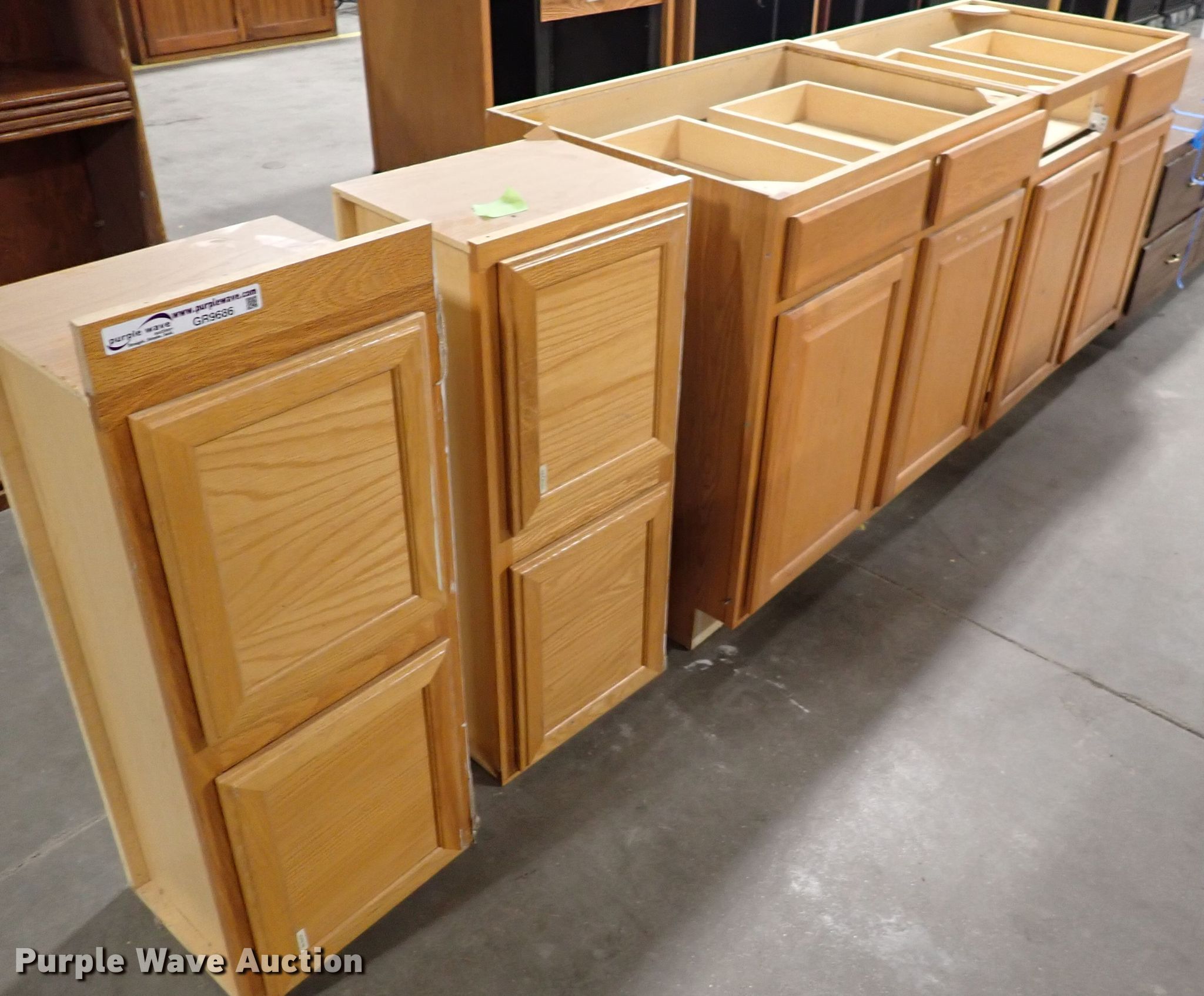 (8) wood cabinets in El Dorado, KS | Item GR9686 sold | Purple Wave