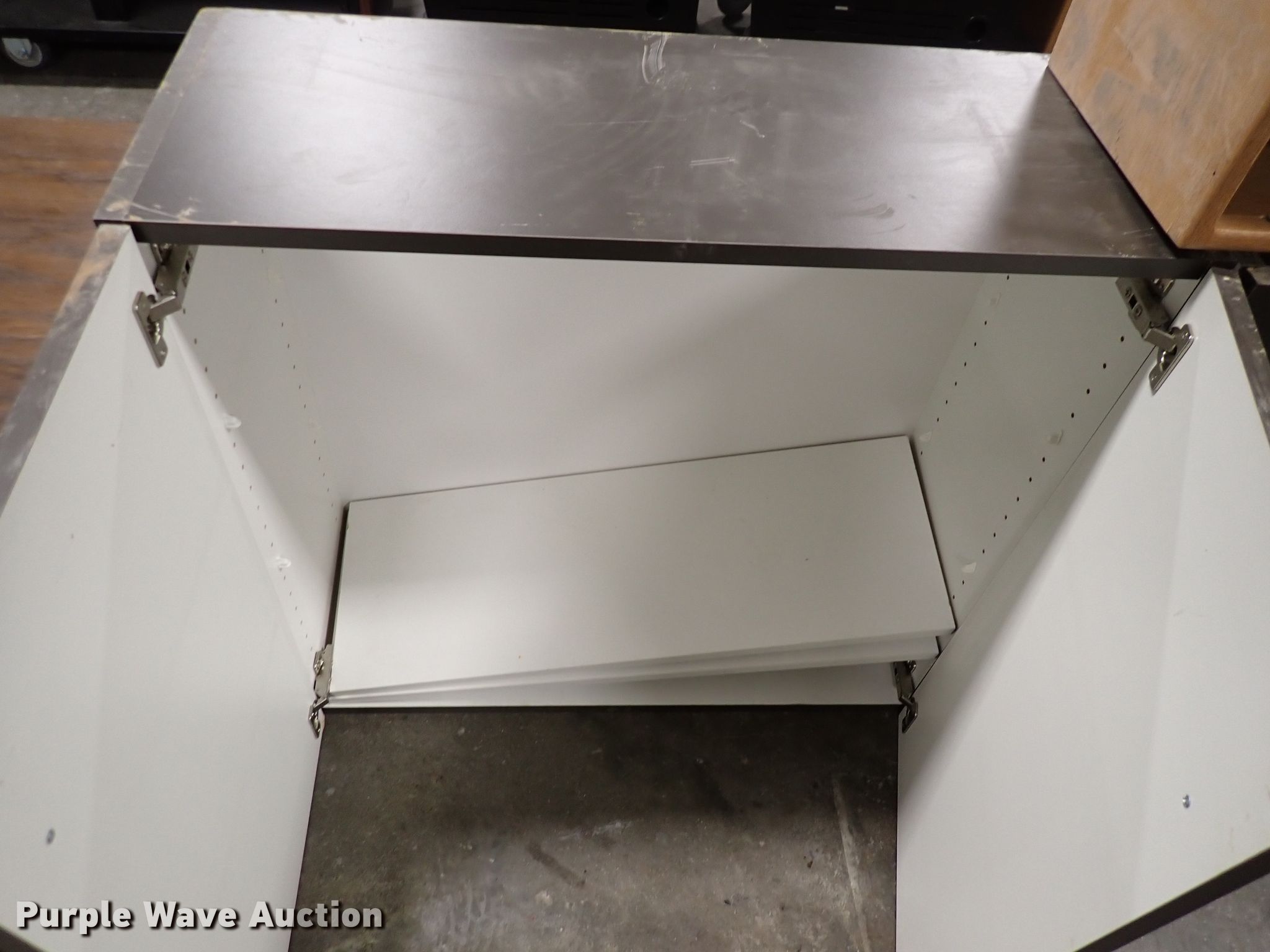 (8) wood cabinets in El Dorado, KS | Item GR9686 sold | Purple Wave