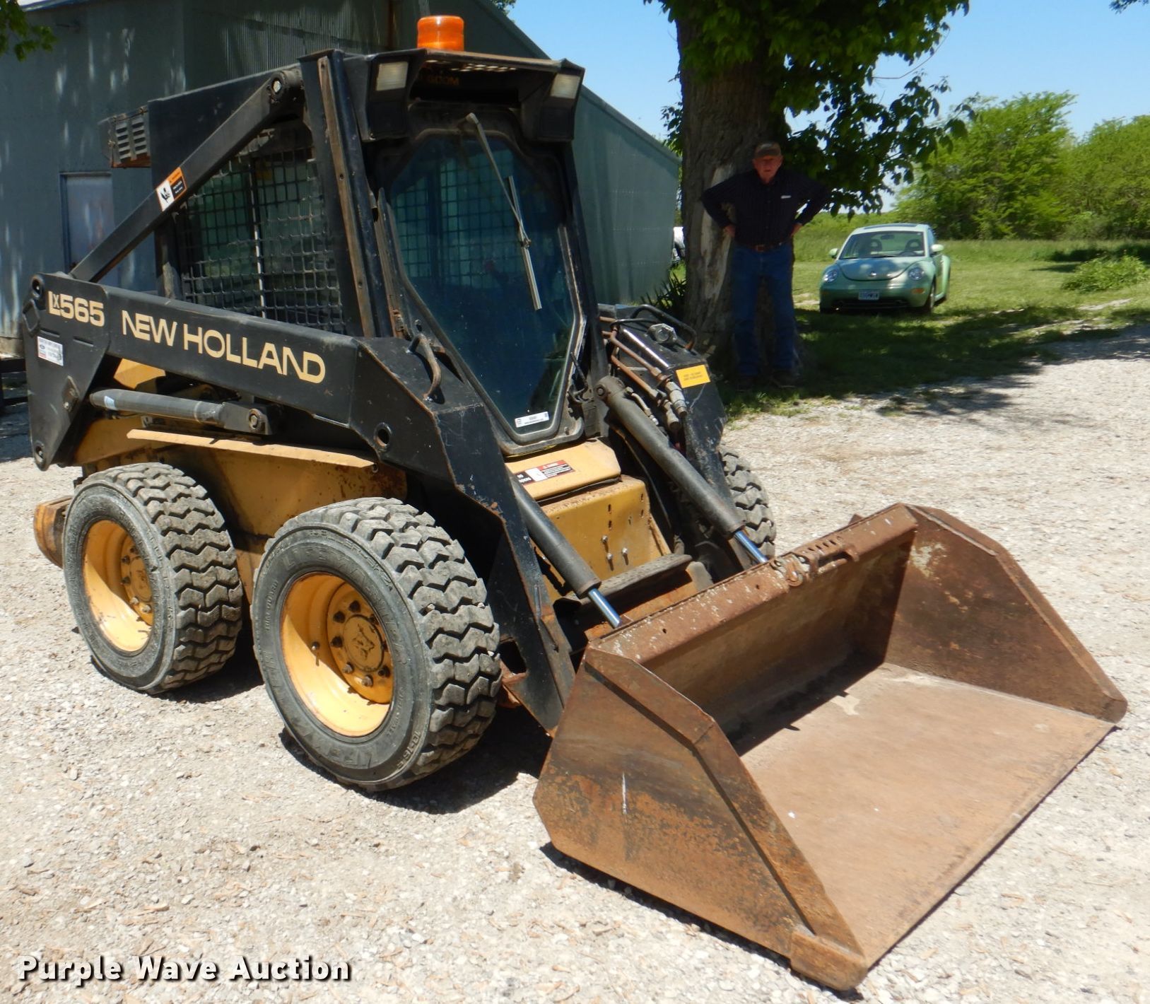 1995 New Holland LX565 skid steer loader in Leeton, MO | Item IQ9481 ...