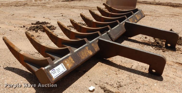 Caterpillar root rake in Hamlin, TX | Item DM6303 sold | Purple Wave