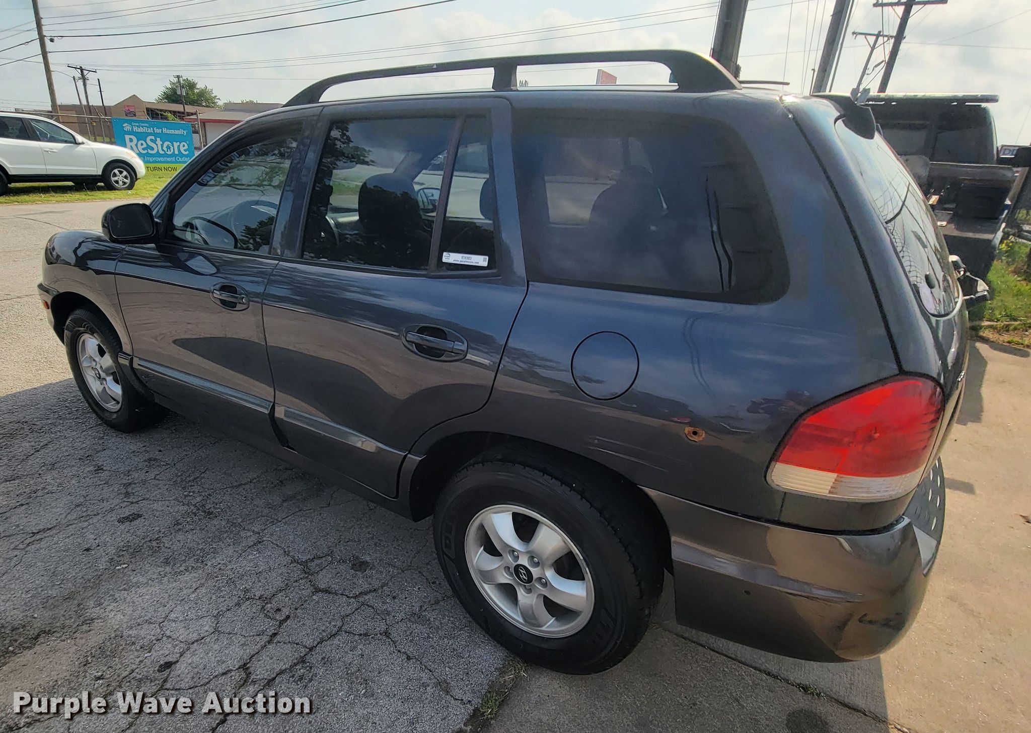 2005 Hyundai Santa Fe SUV in Tulsa, OK | Item IE9383 sold | Purple Wave
